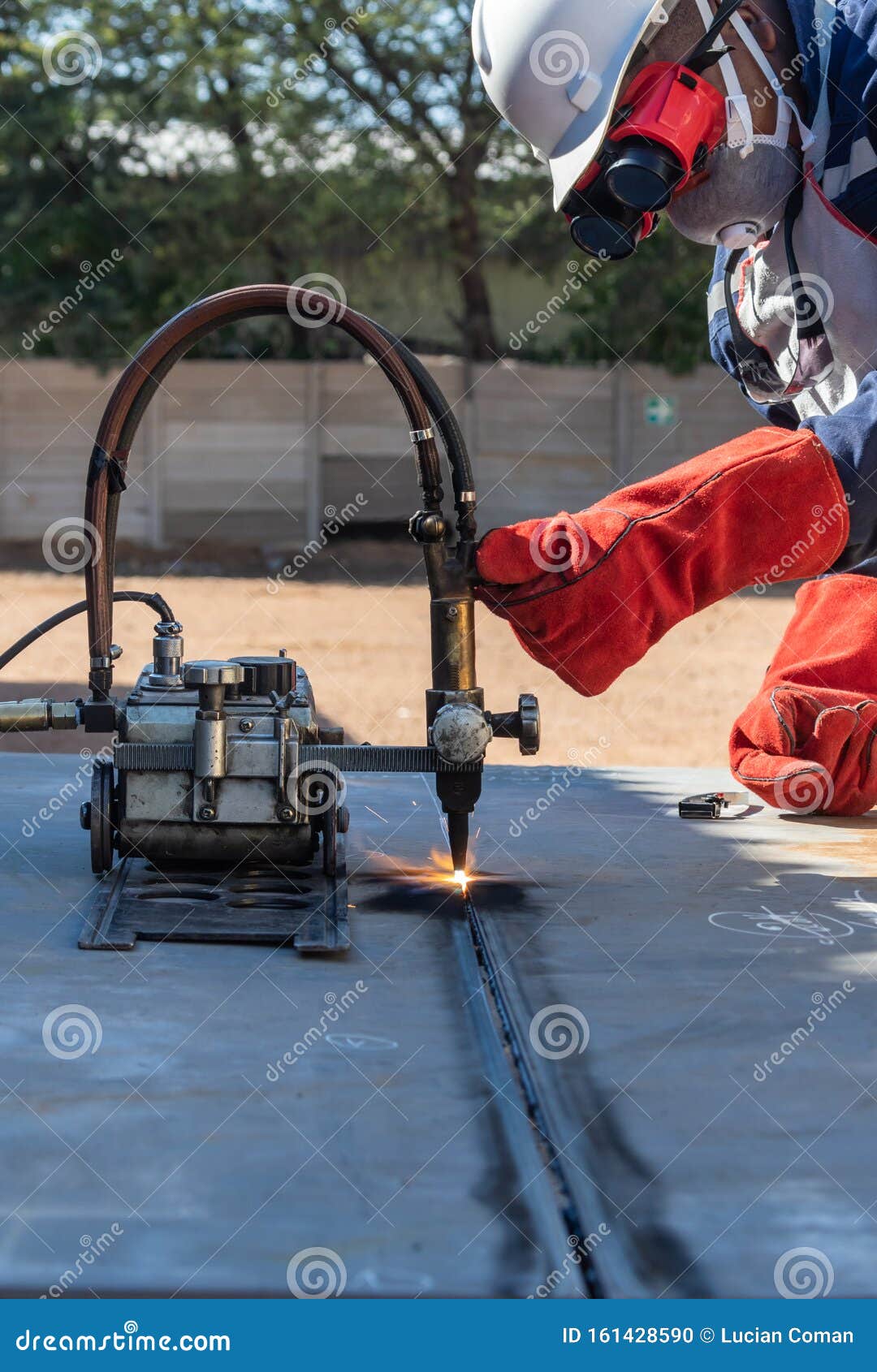 African Worker with a Cutting Torch Stock Photo - Image of manual ...