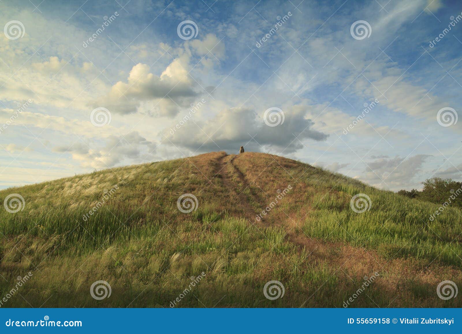 Mound at sunset stock photo. Image of road, spring, view - 55659158