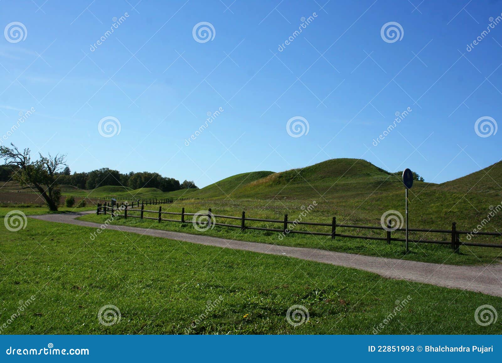 Mounds and the fence stock image. Image of last, grass - 22851993