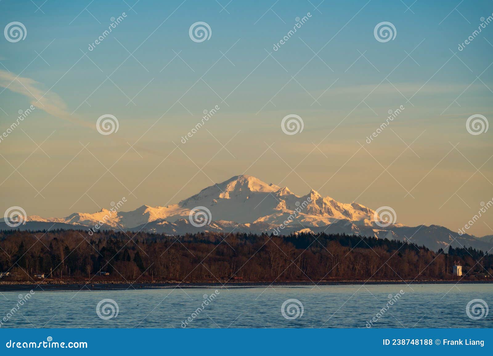 Mount Baker at Sunset Time with Two Wild Geese Flew by Stock Photo ...
