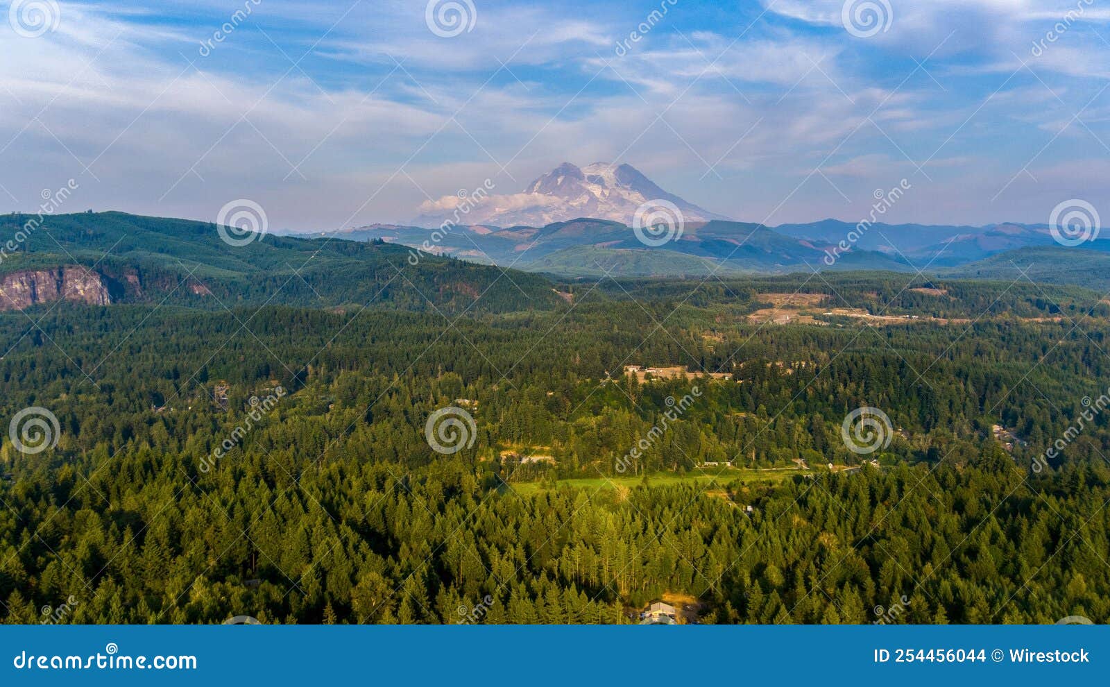 Mount Rainier on the Horizon in August Stock Photo - Image of rainier ...