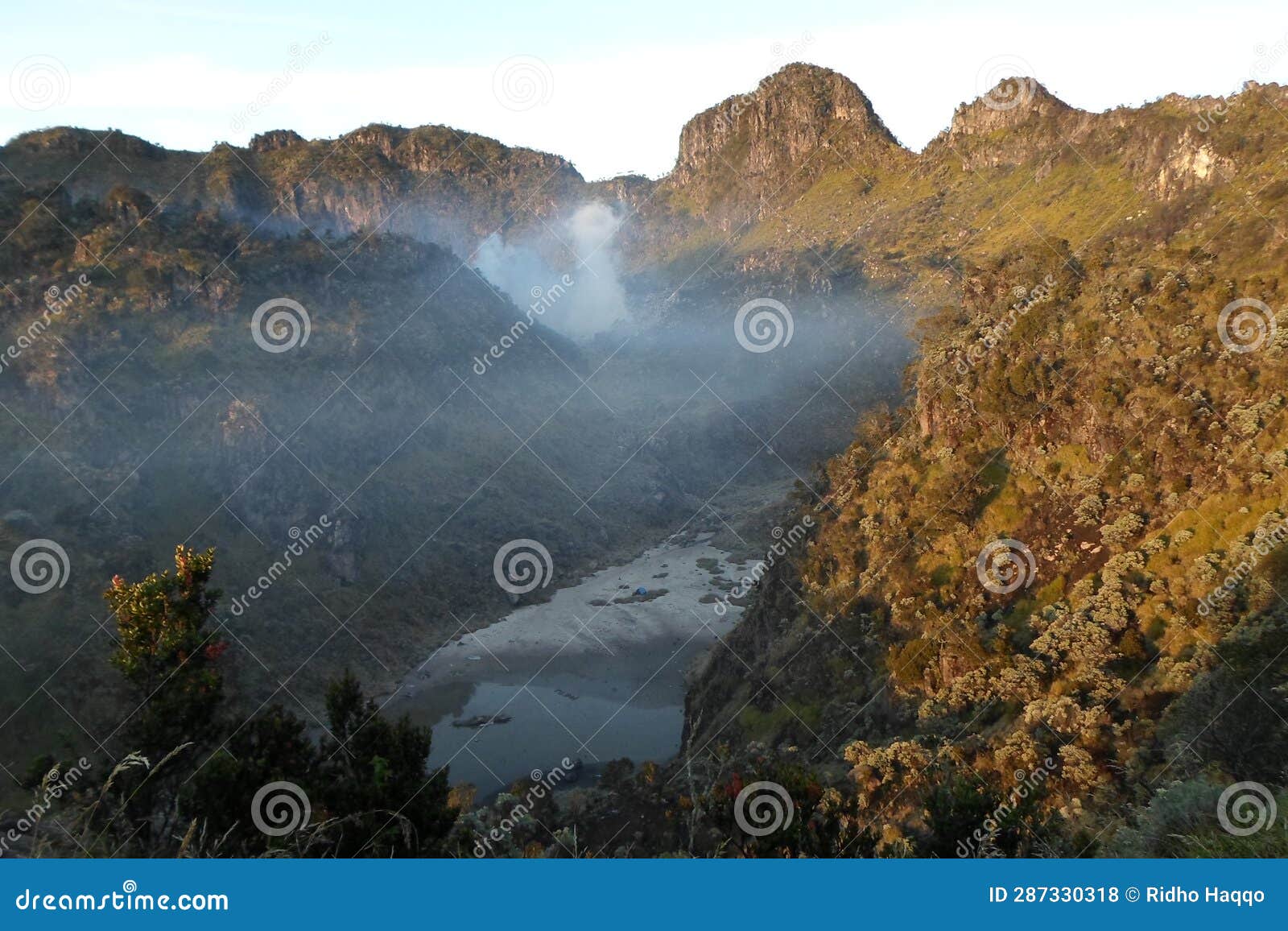 Cleft mountain peak stock photo. Image of tree, nature - 287330318