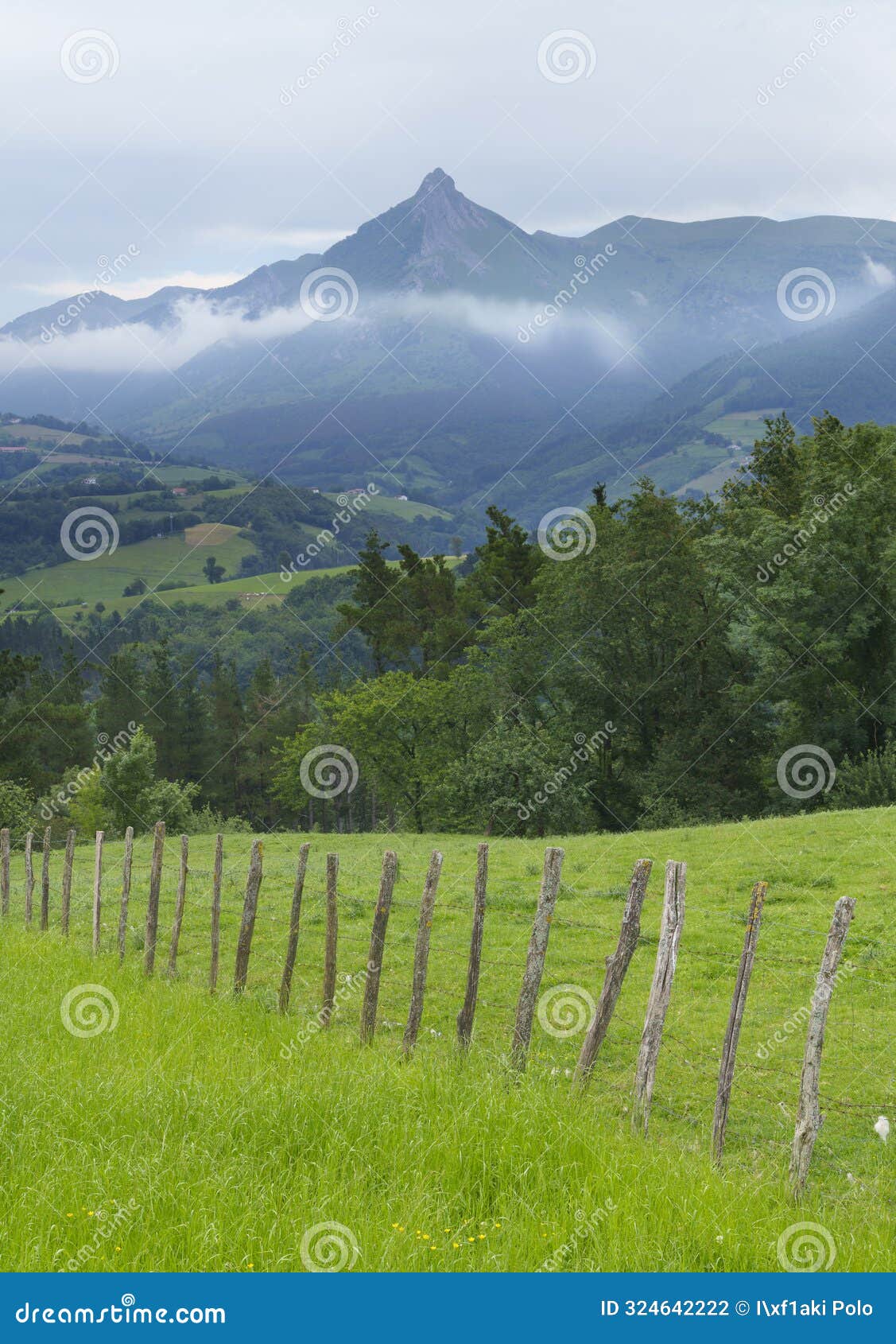 Mount Txindoki from Lazkaomendi. Meadows in Lazkaomendi with Mount ...