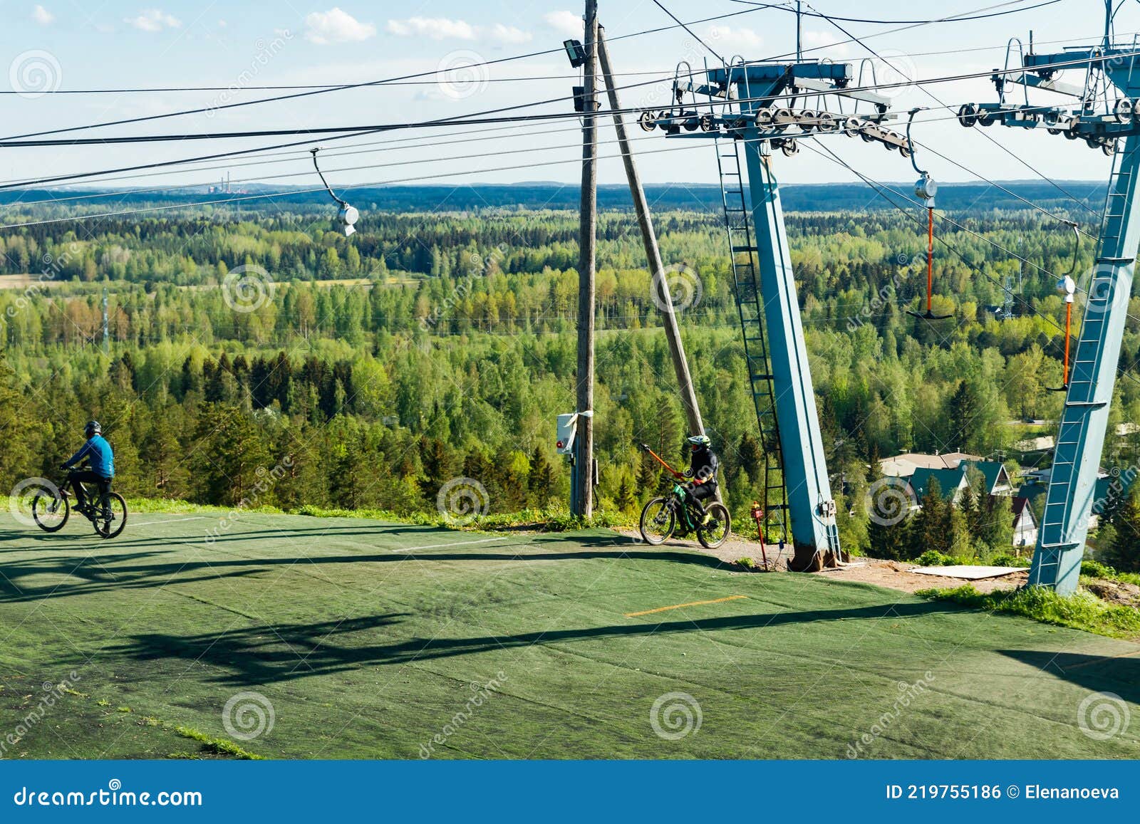 Mountain Biker on the Elevator at Ski Slope Stock Photo - Image of ...