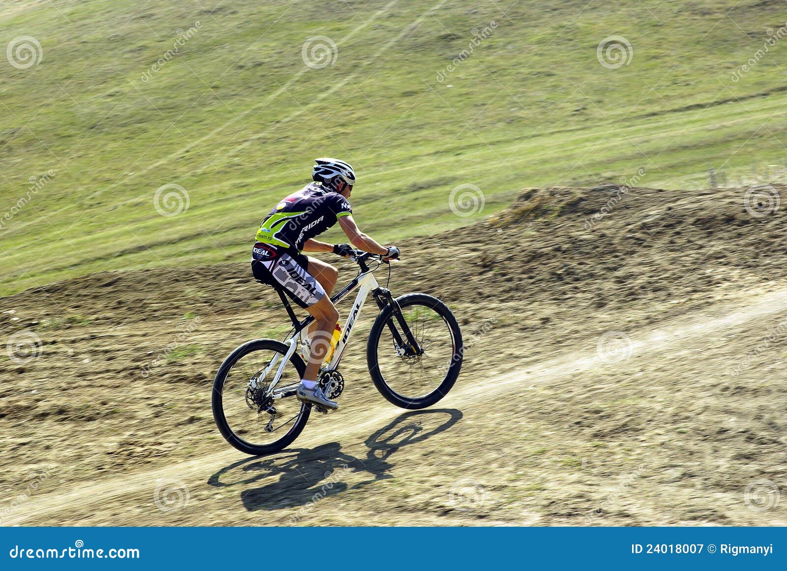 Mountain biker racing editorial photography. Image of bicycling - 24018007