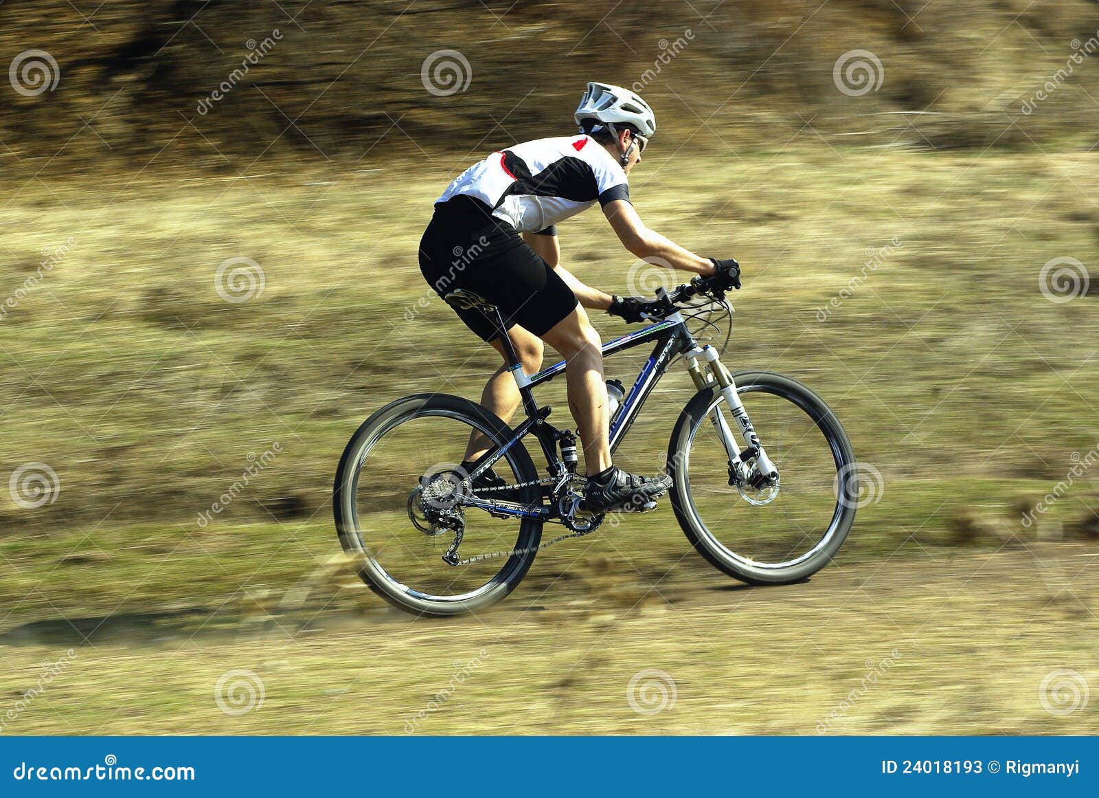 Mountain biker racing editorial stock photo. Image of rider - 24018193