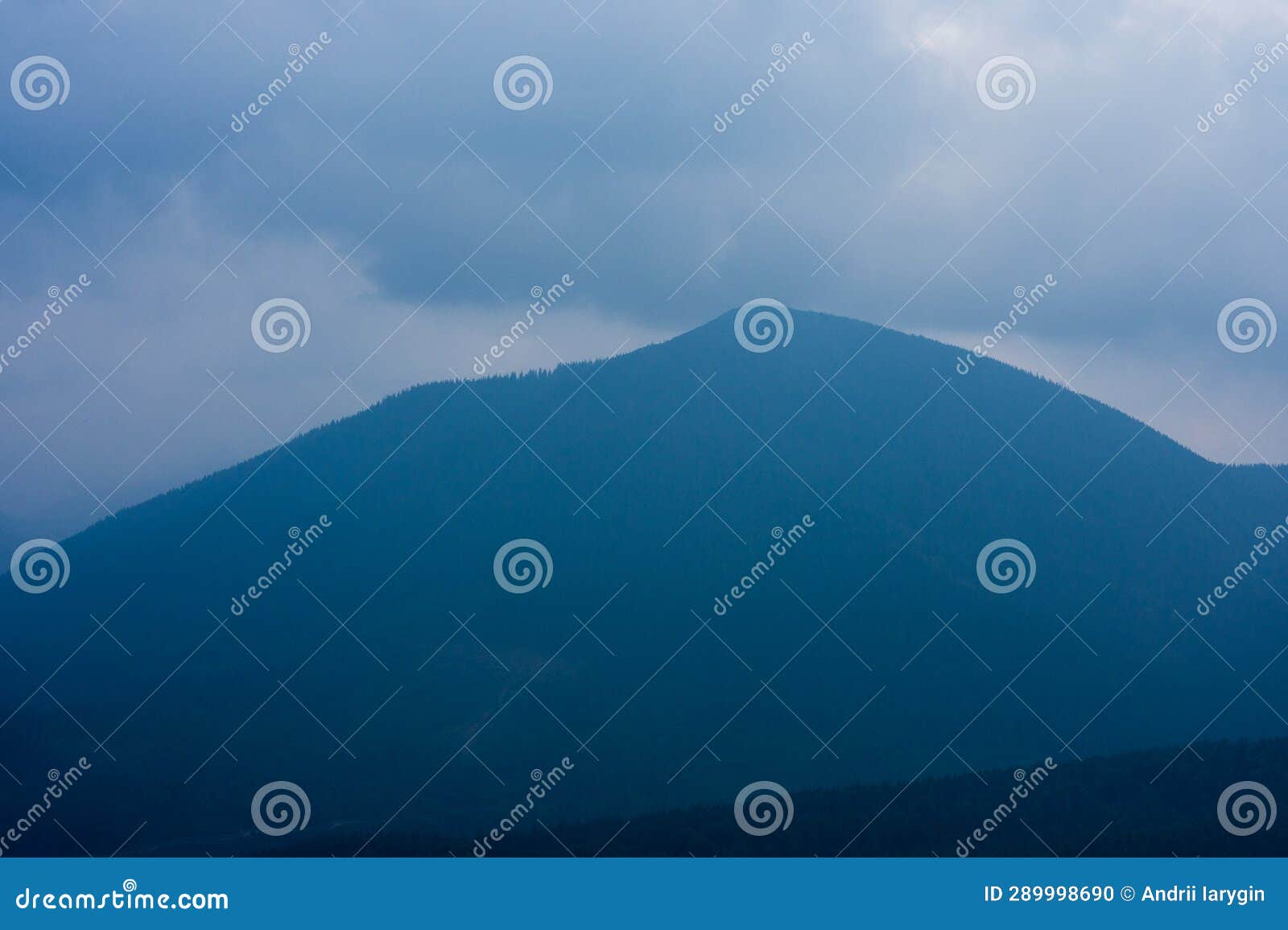 Mountain blue silhouette stock photo. Image of peak - 289998690