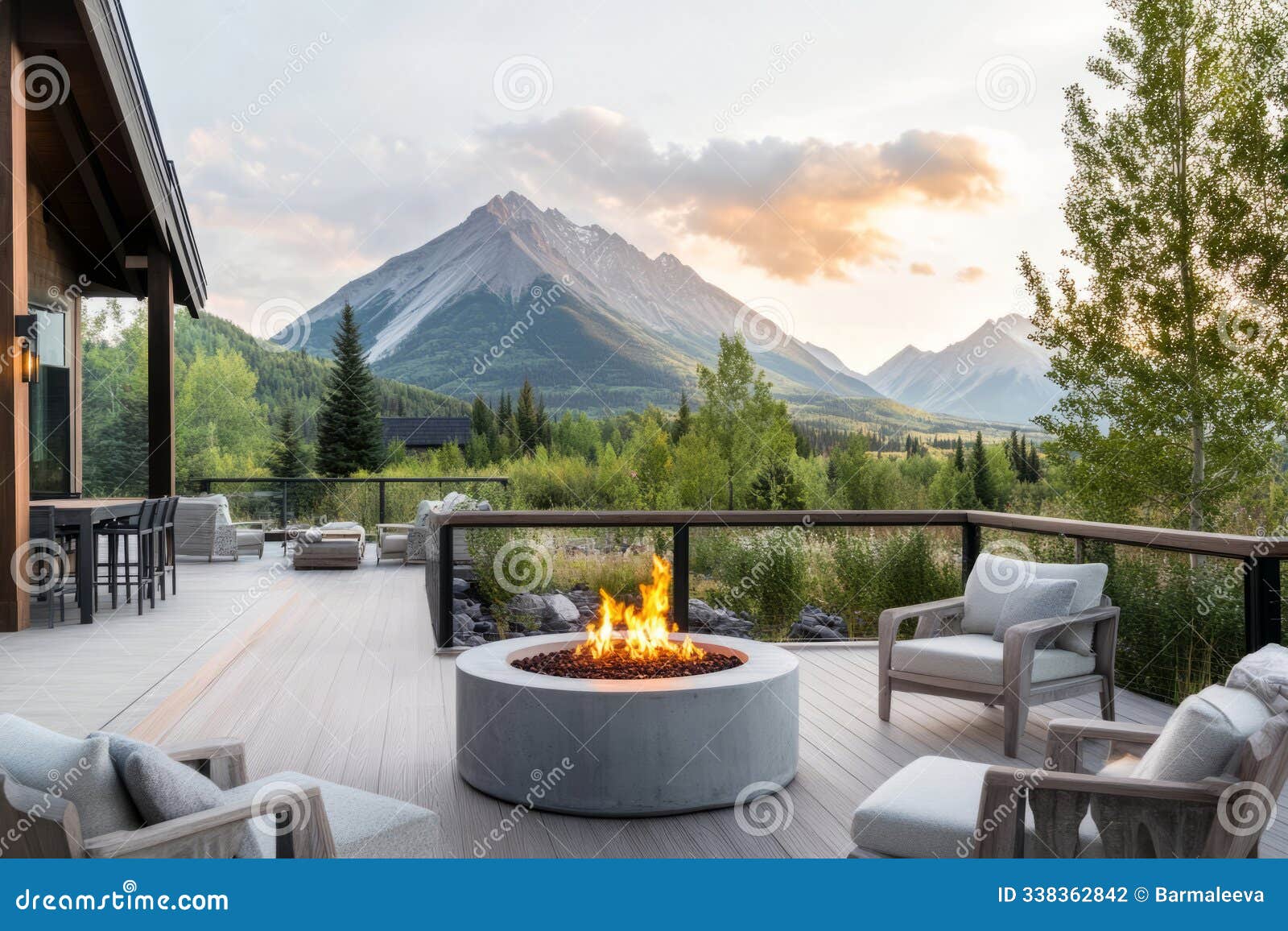 Mountain Cabin with a Fire Pit ,and Mountains in the Background Stock ...