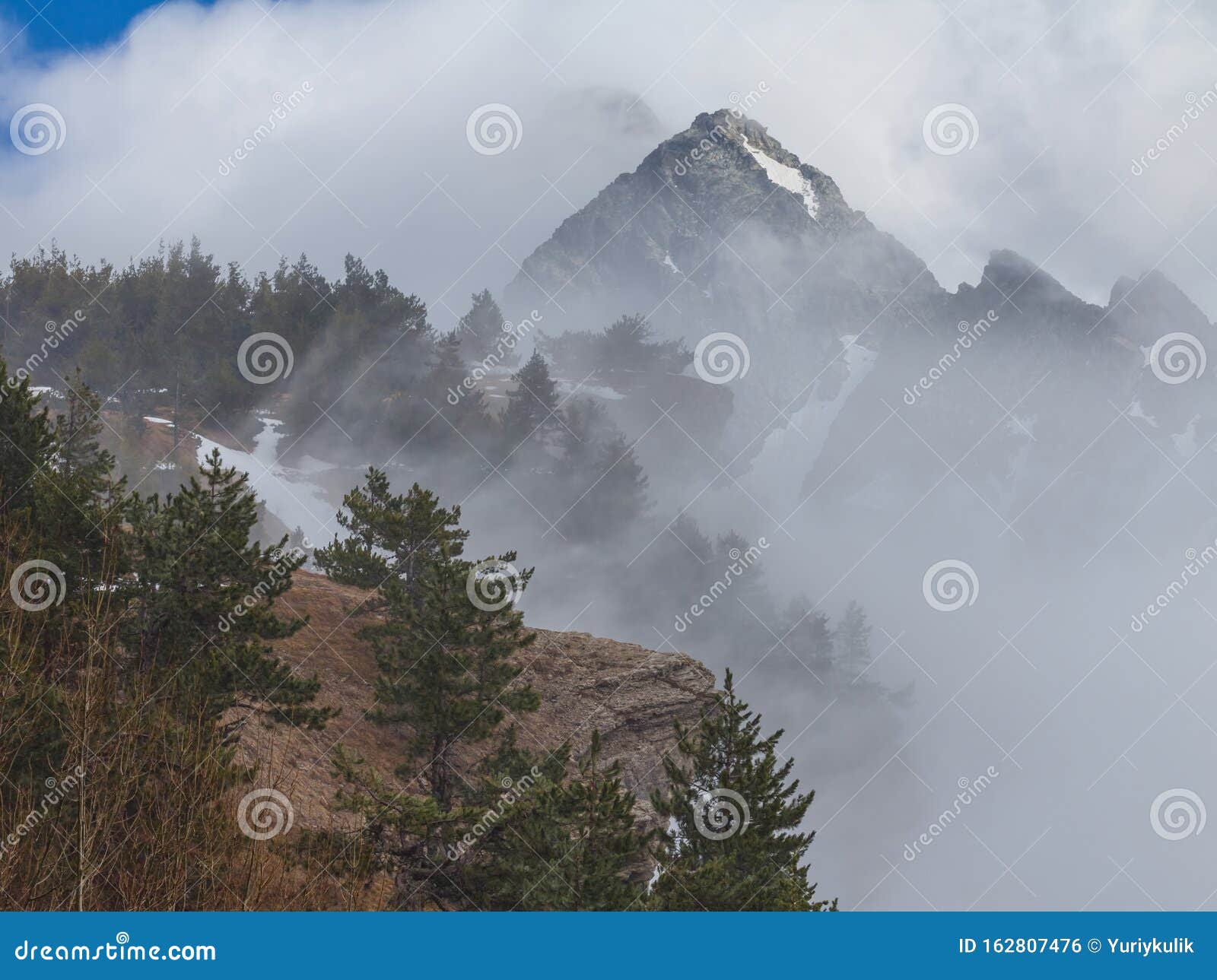 Mountain Chain in a Mist and Dense Clouds Stock Photo - Image of haze ...