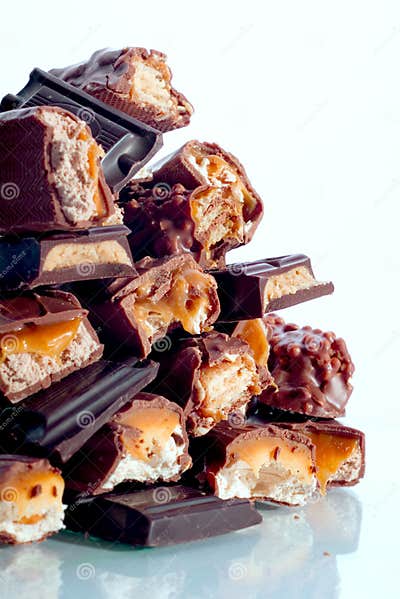 A Mountain of Chocolate Bars Stock Photo - Image of candy, black: 1945538
