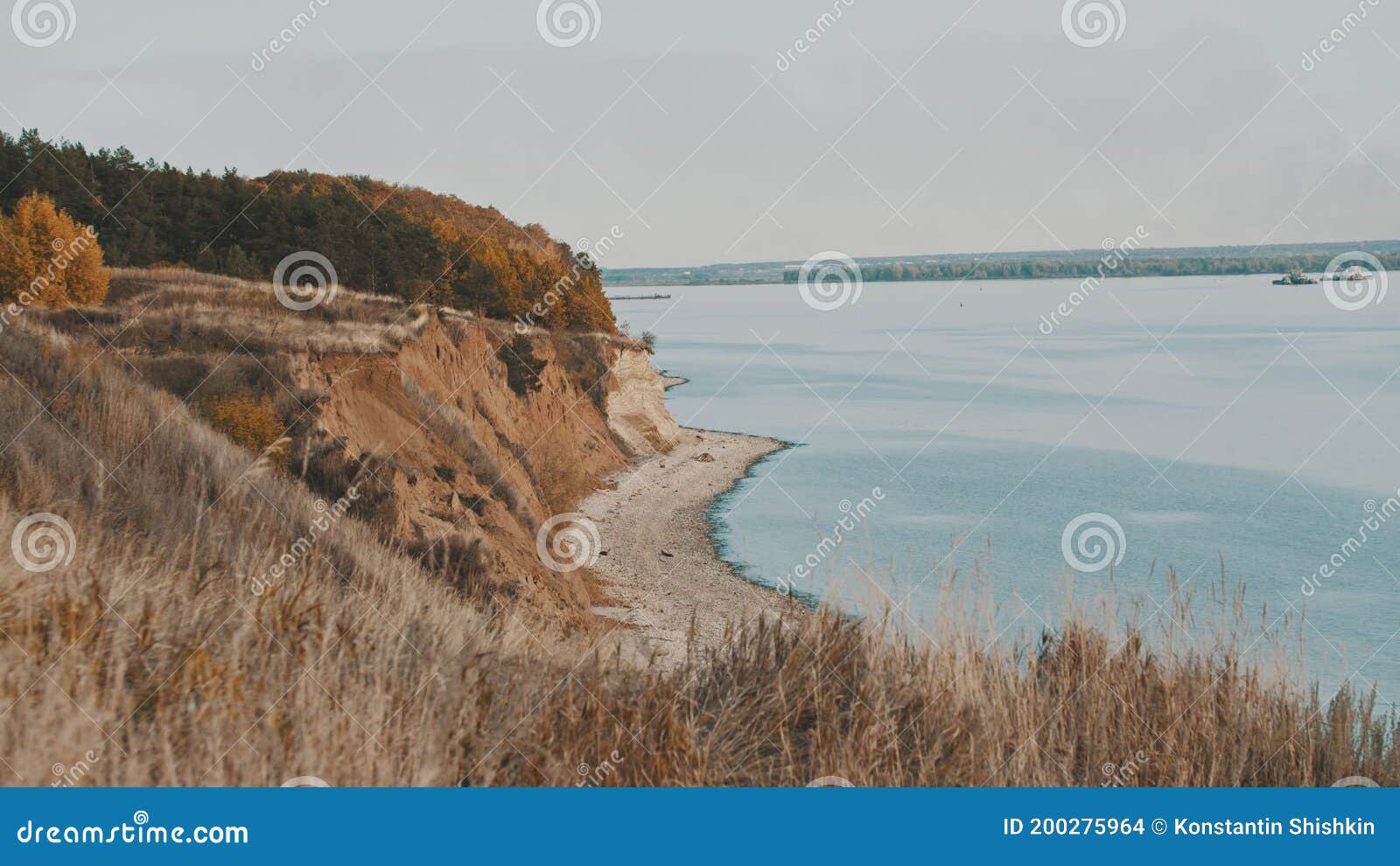 Mountain Cliff and River in Cloudy Weather - Cargo Ships Crossing the ...