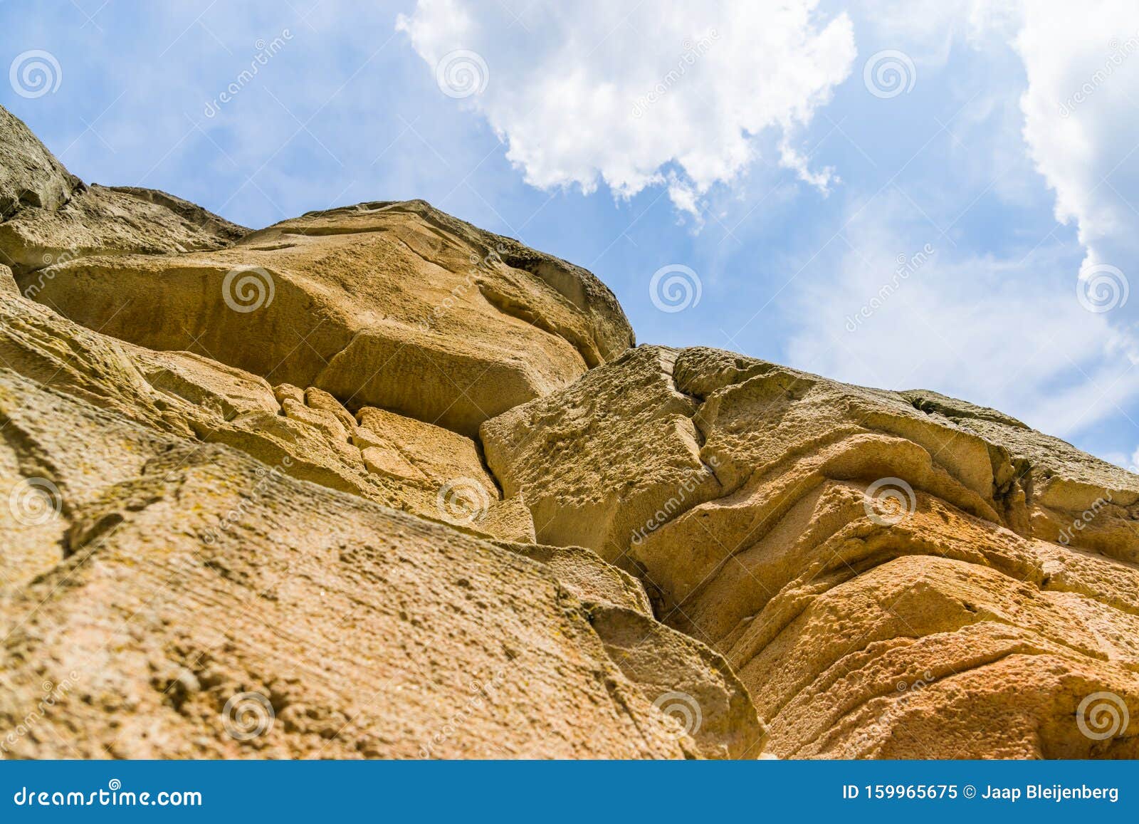 Mountain Cliff with Rocks and a Blue Cloudy Sky, Nature Background ...