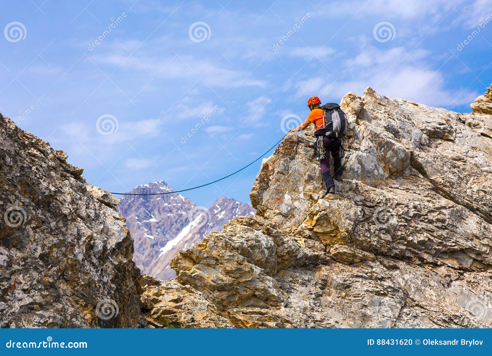 Mountain Climber on Rocky Ridge with Rope and Safety Gear Stock Photo ...