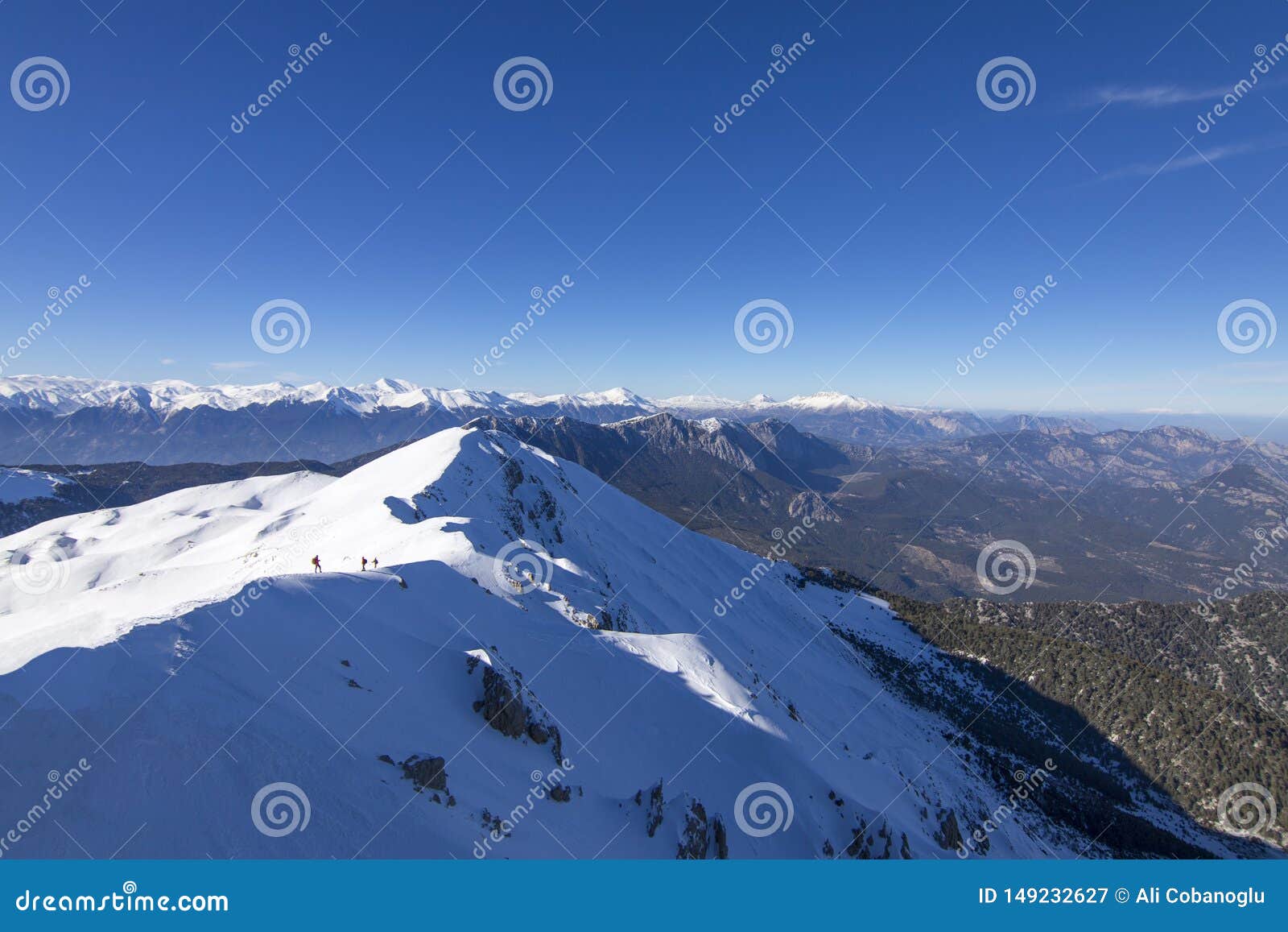 3 Mountain Climbers Walk on Snow in Mountains Stock Image - Image of ...