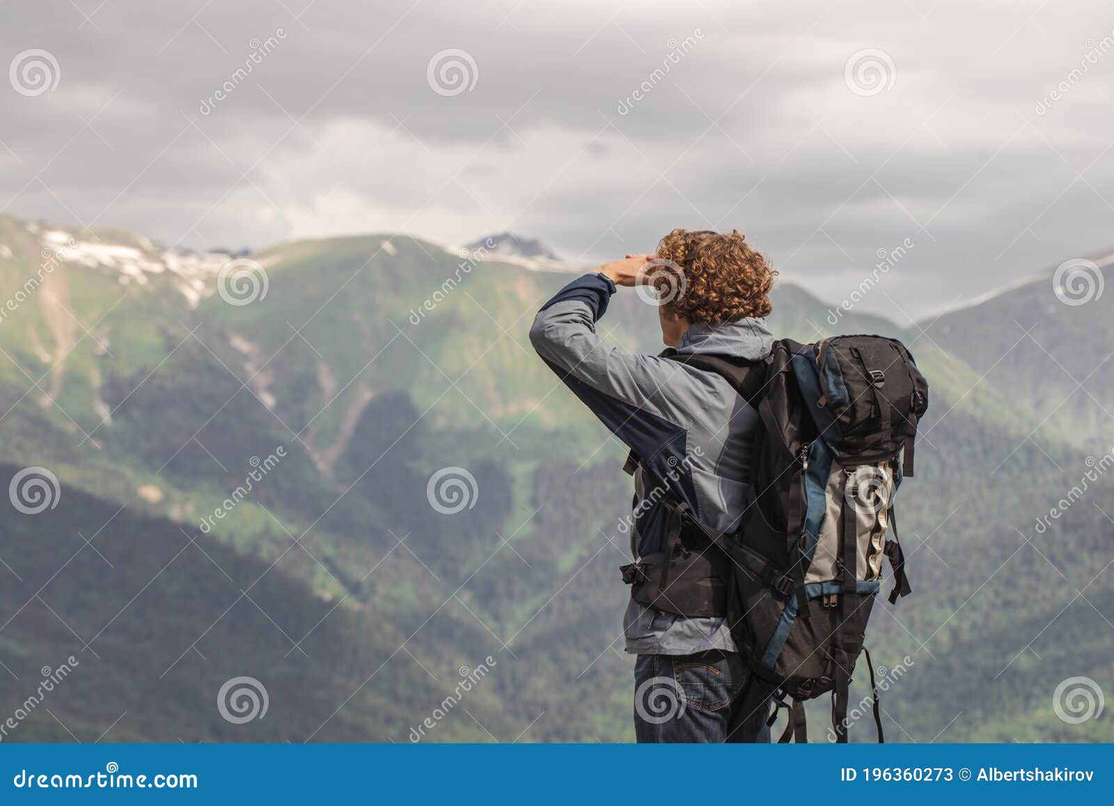 Mountain Climbing Concept. Adventurous Guy is Looking for the Way Stock ...