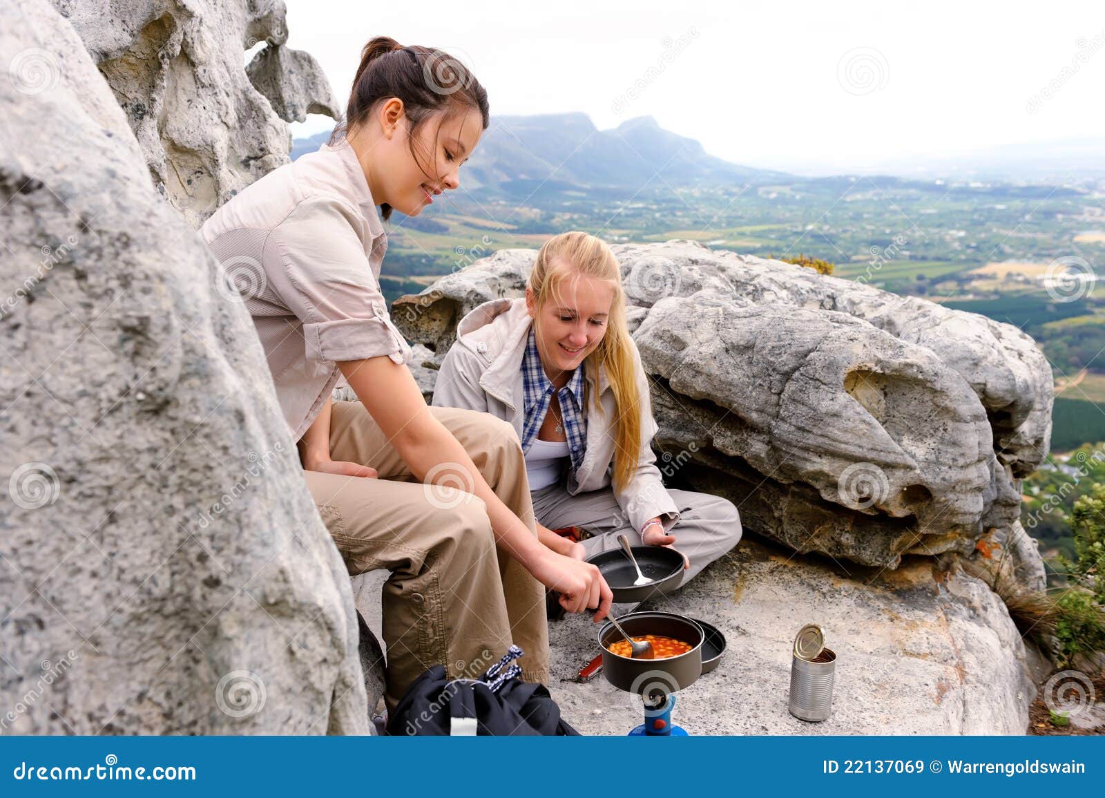 Mountain hikers cook food stock image. Image of burner - 22137069