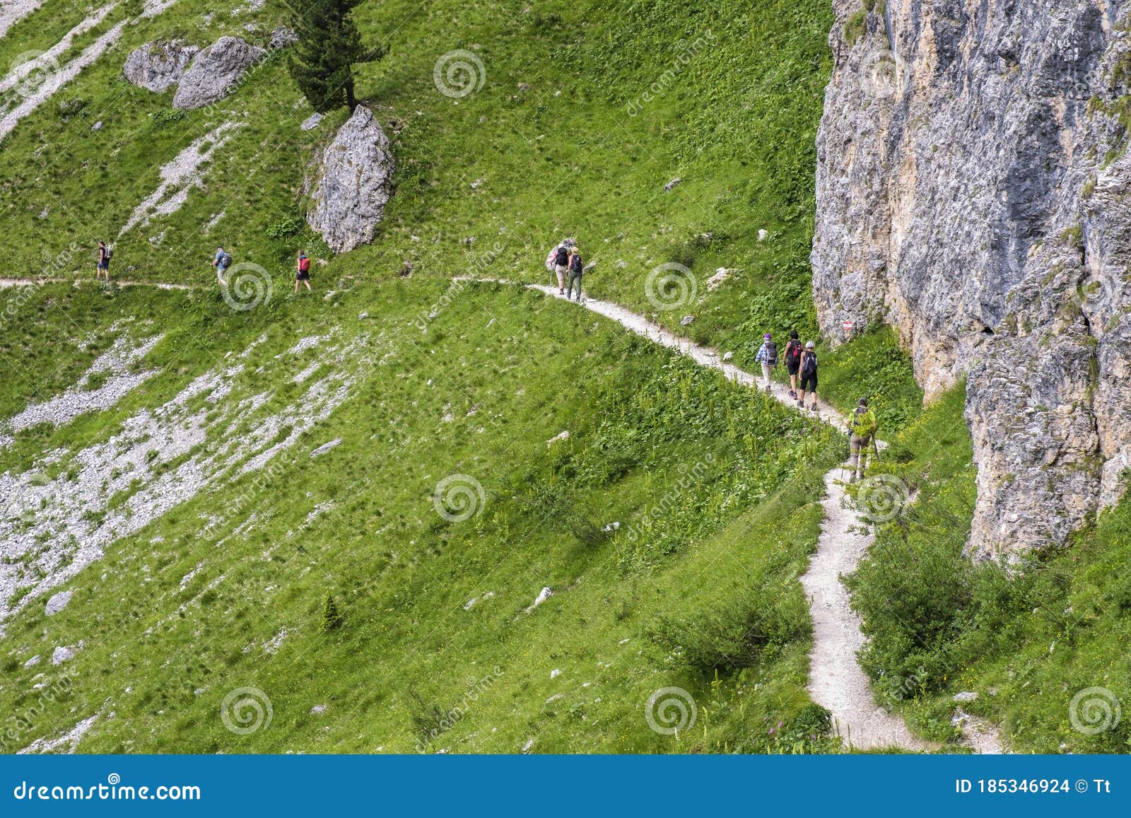 Mountain Hikers on a Trail on a Mountain Side Stock Photo - Image of ...