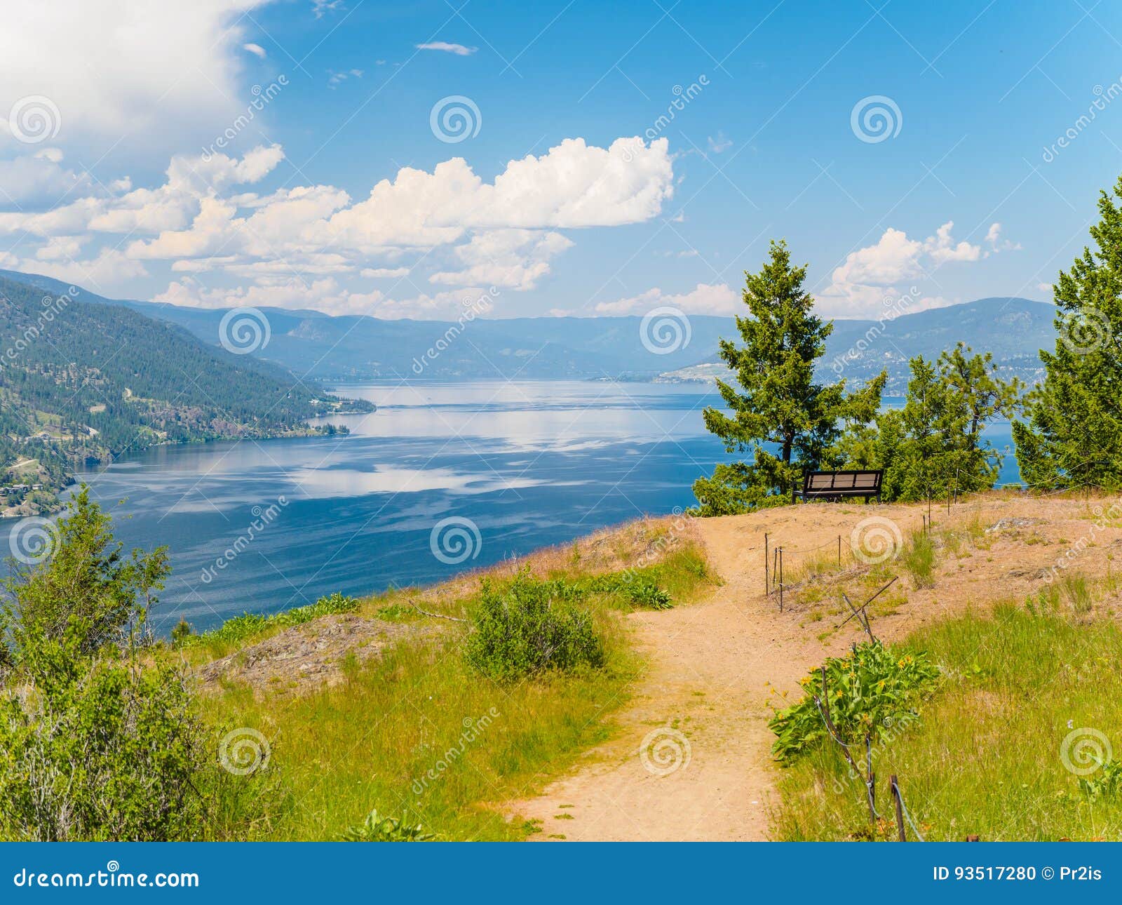 Mountain Hiking Trail with Bench Overlooking the Lake Stock Photo ...