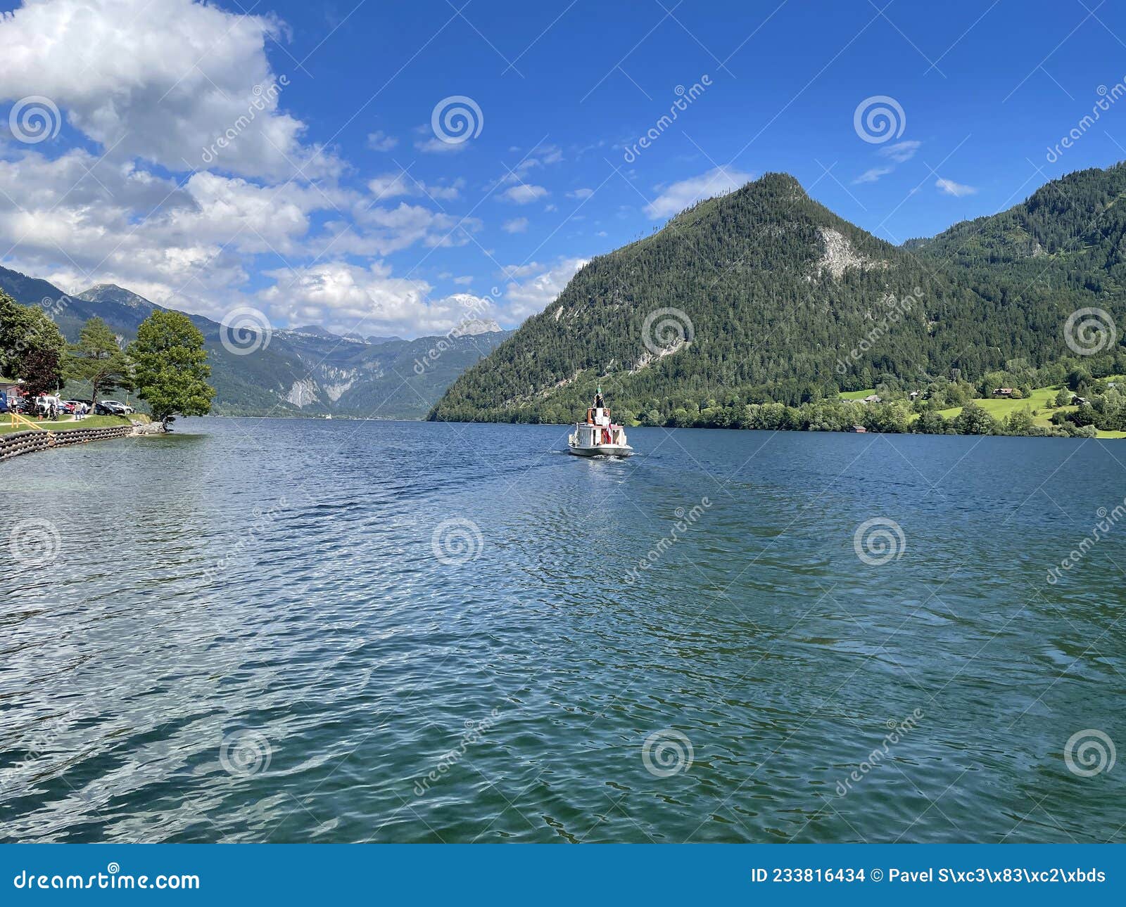 Mountain Lake with a Steamboat on the Water Stock Photo - Image of ...