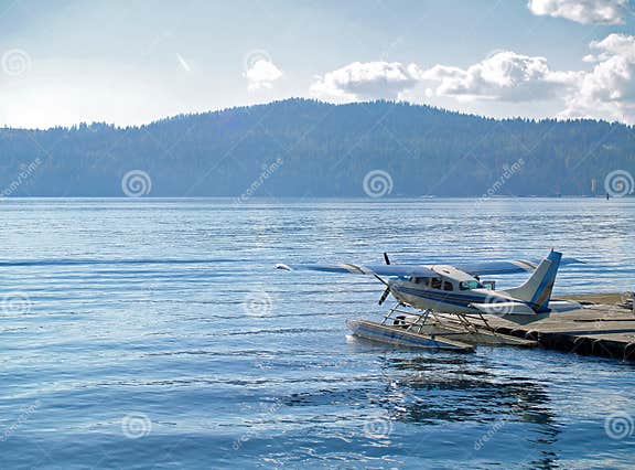 A Mountain Lake with a Water Plane Stock Photo - Image of mountain ...
