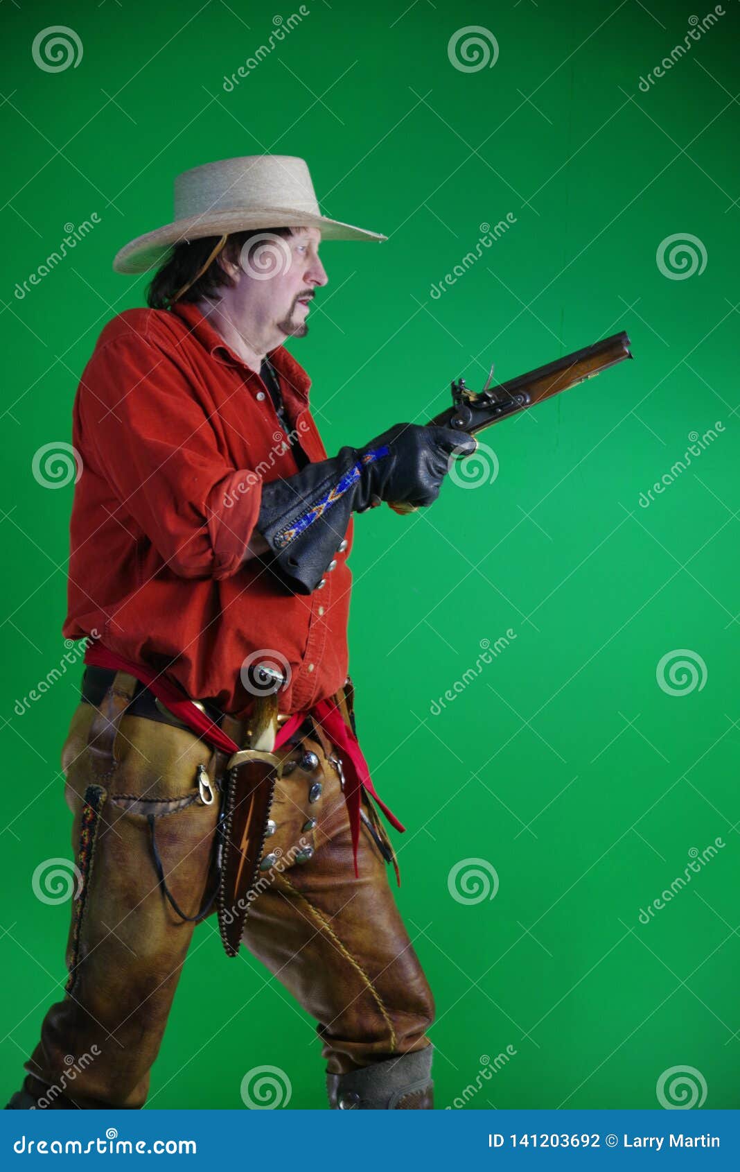 Mountain Man with Muzzle Loader Pistol Stock Photo - Image of holster ...
