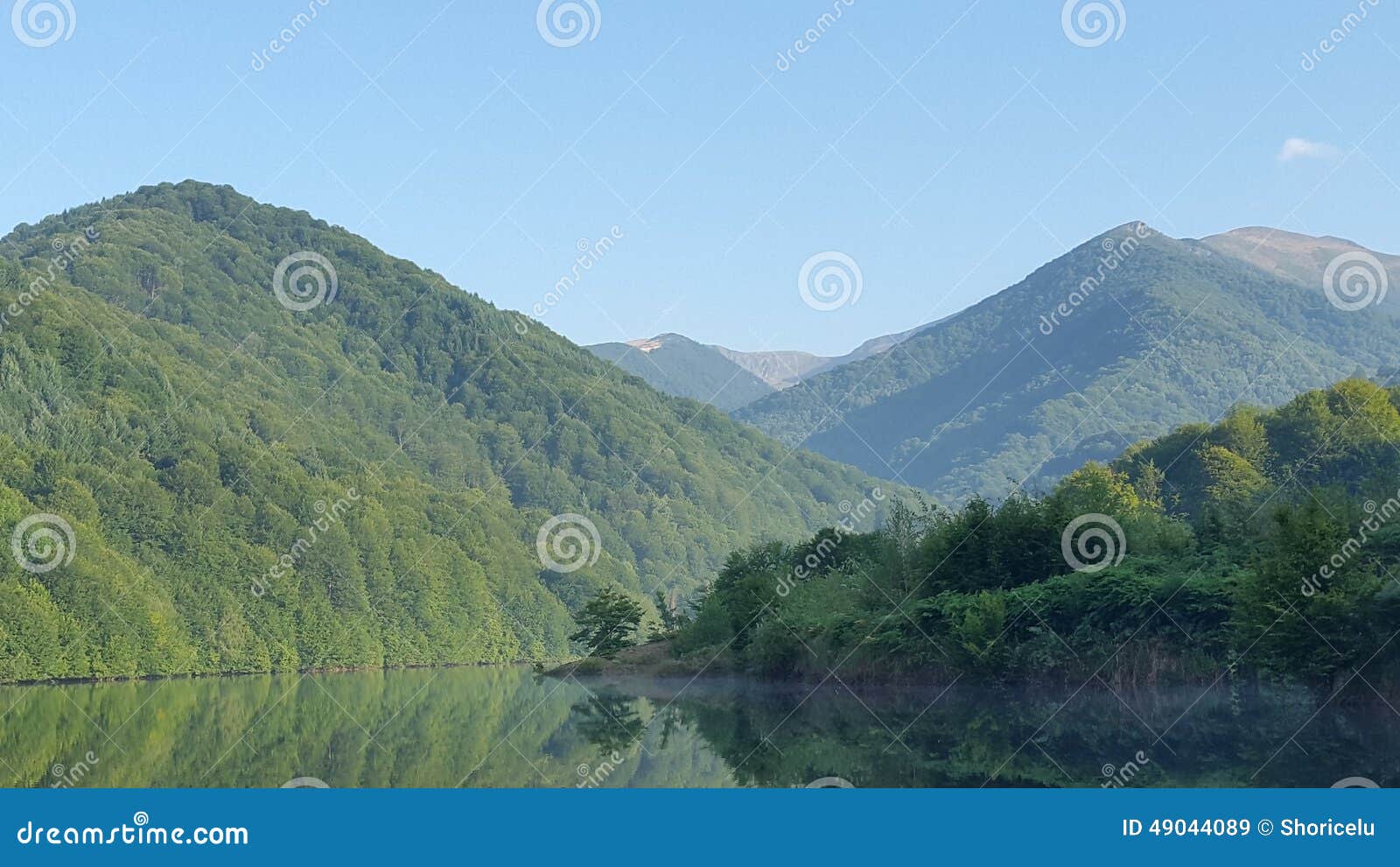 Mountain Peaks with Water Reflections Stock Image - Image of surface ...