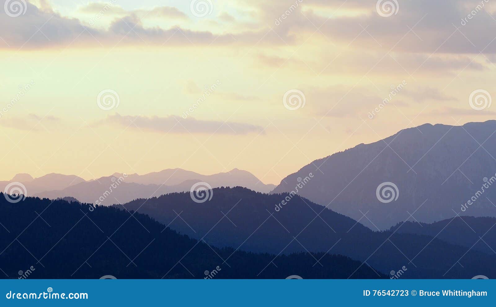 Mountain Range at Dusk stock image. Image of layered - 76542723