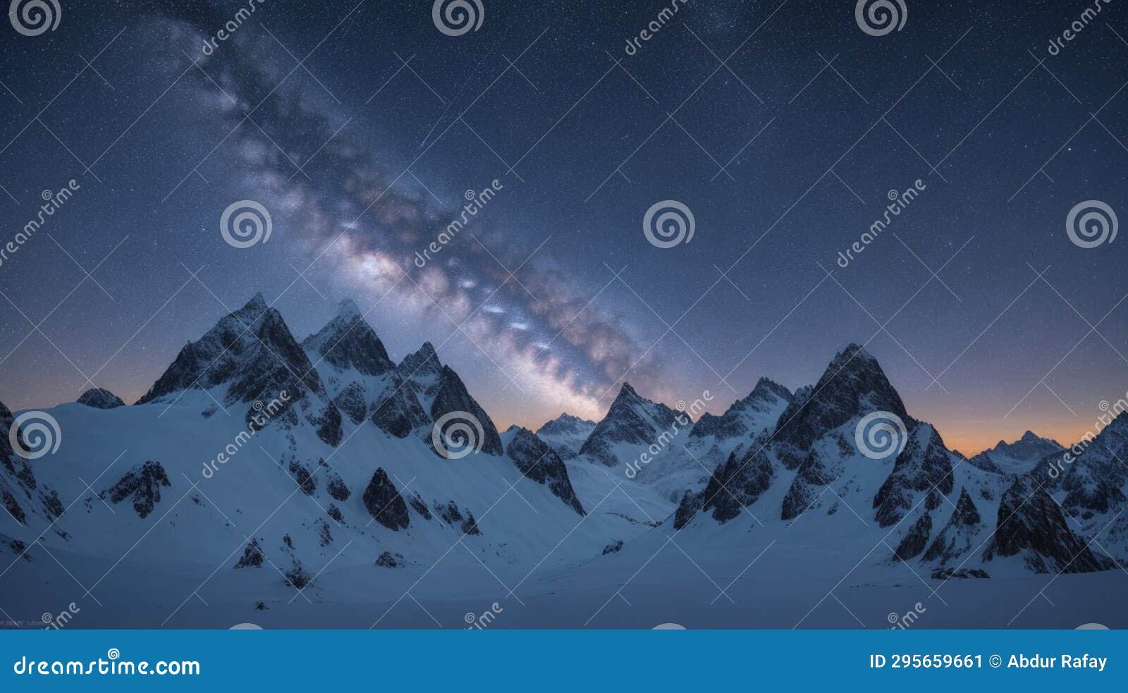 A Mountain Range with Snow-capped Peaks Under the Starlight Stock ...