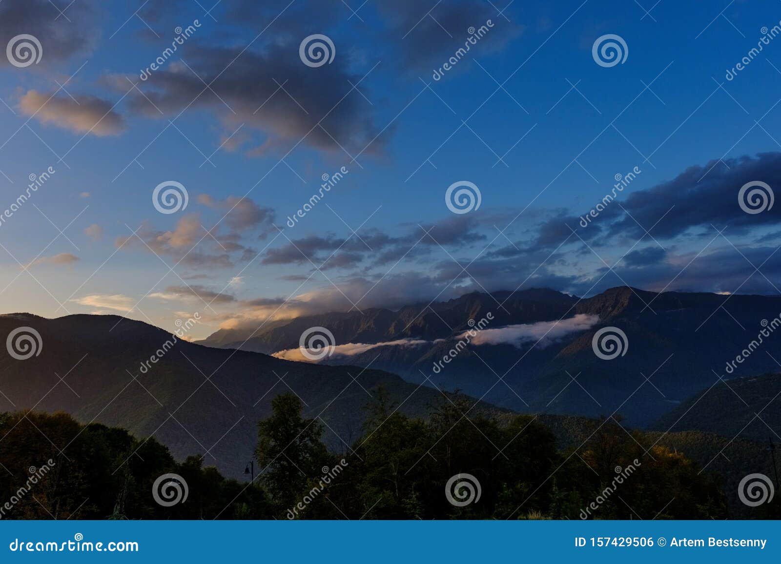 Mountain Ranges and Clouds in the Evening Light. Stock Photo - Image of ...