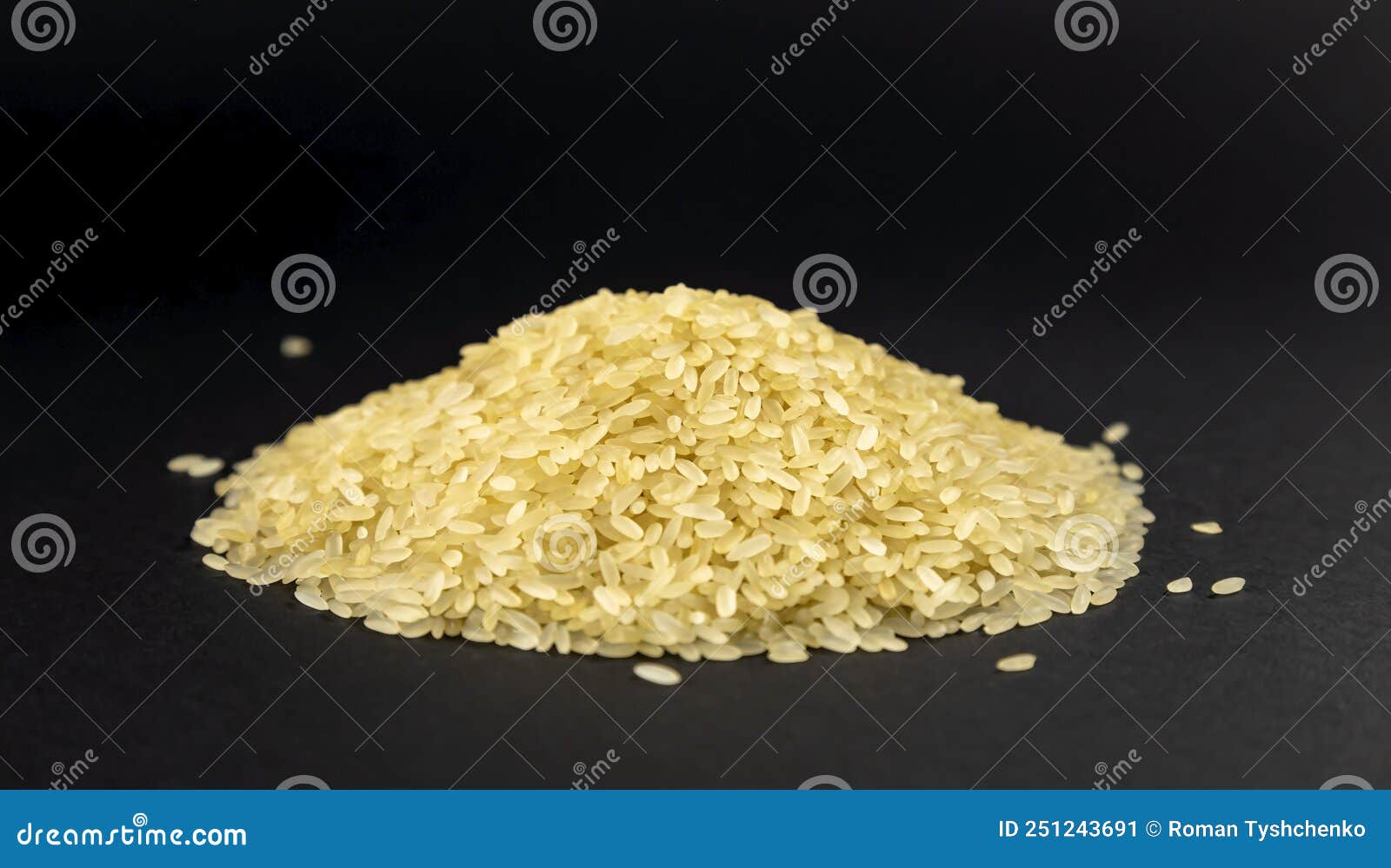 A Mountain of Raw Steamed Rice Grains is Piled on a Black Background ...