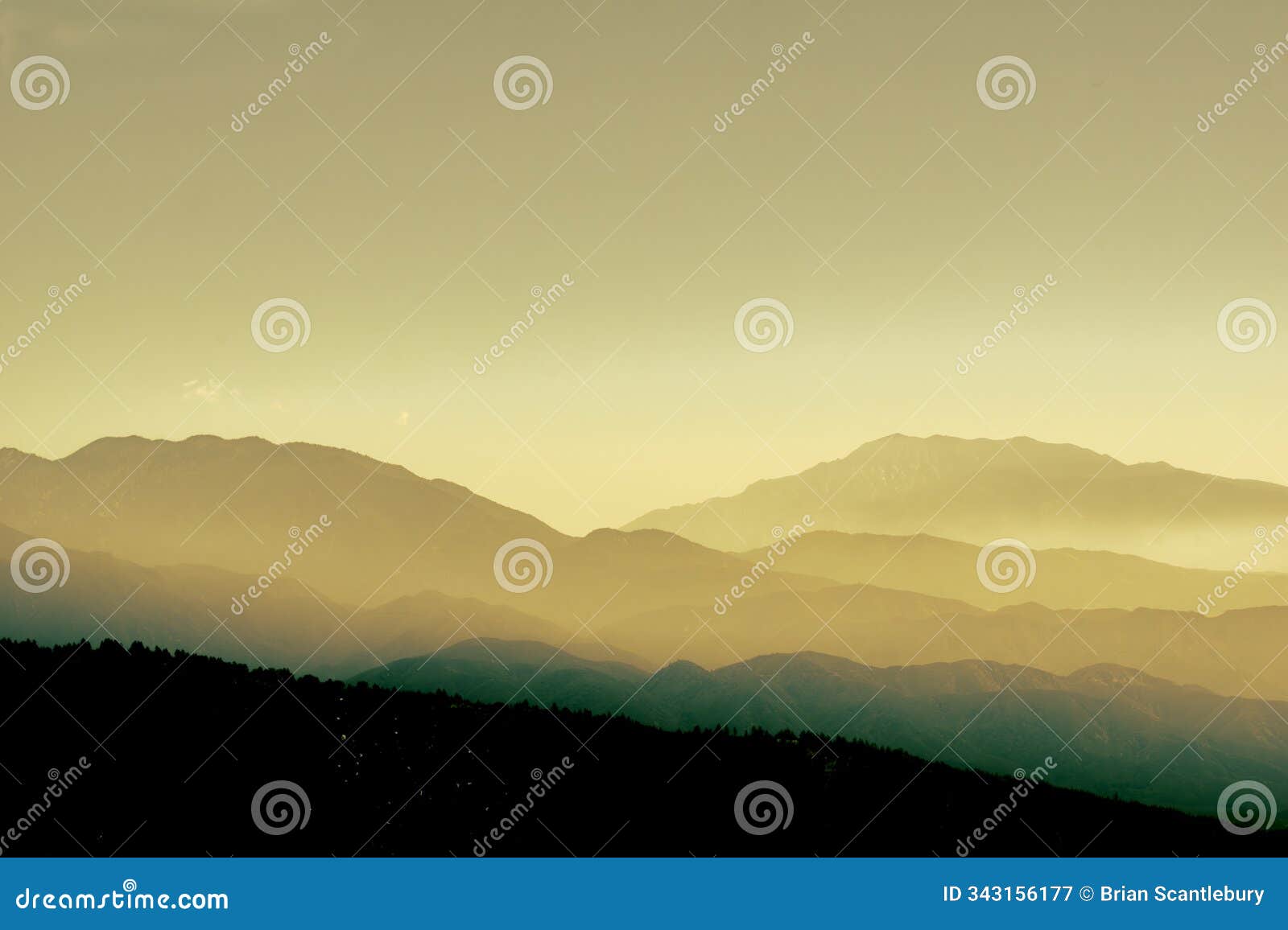 The Mountain Ridges With Sun Light, Sunset Sky And The Blurred Rock ...