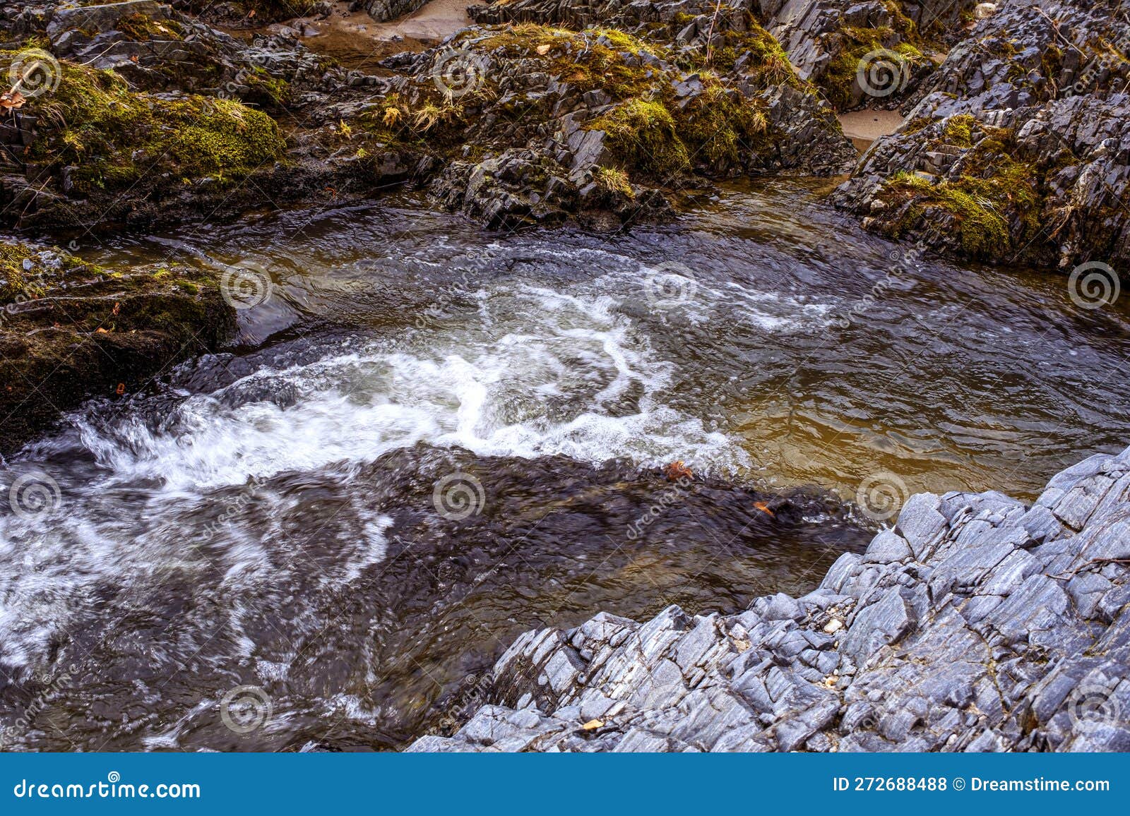 A Mountain River Flows between Rocks Stock Photo - Image of motion ...