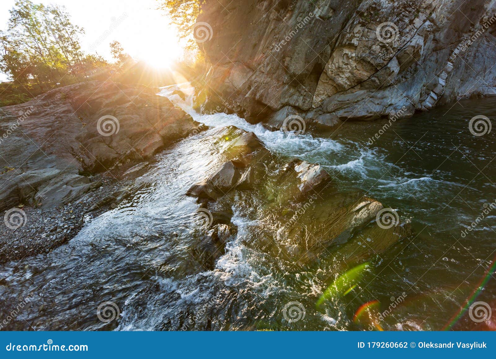 Mountain River Small Waterfall among Rocks Stones in the Rays of the ...
