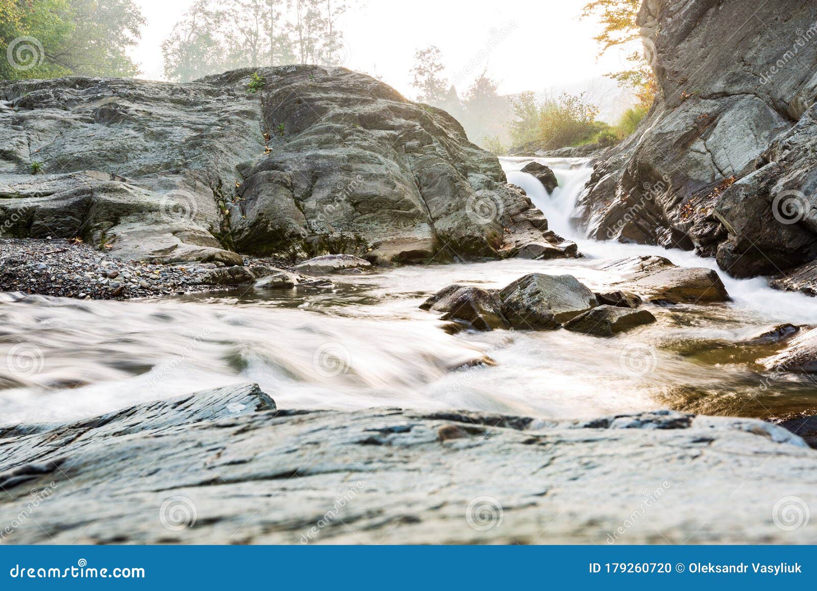 Mountain River Small Waterfall among Rocks Stones in the Rays of the ...