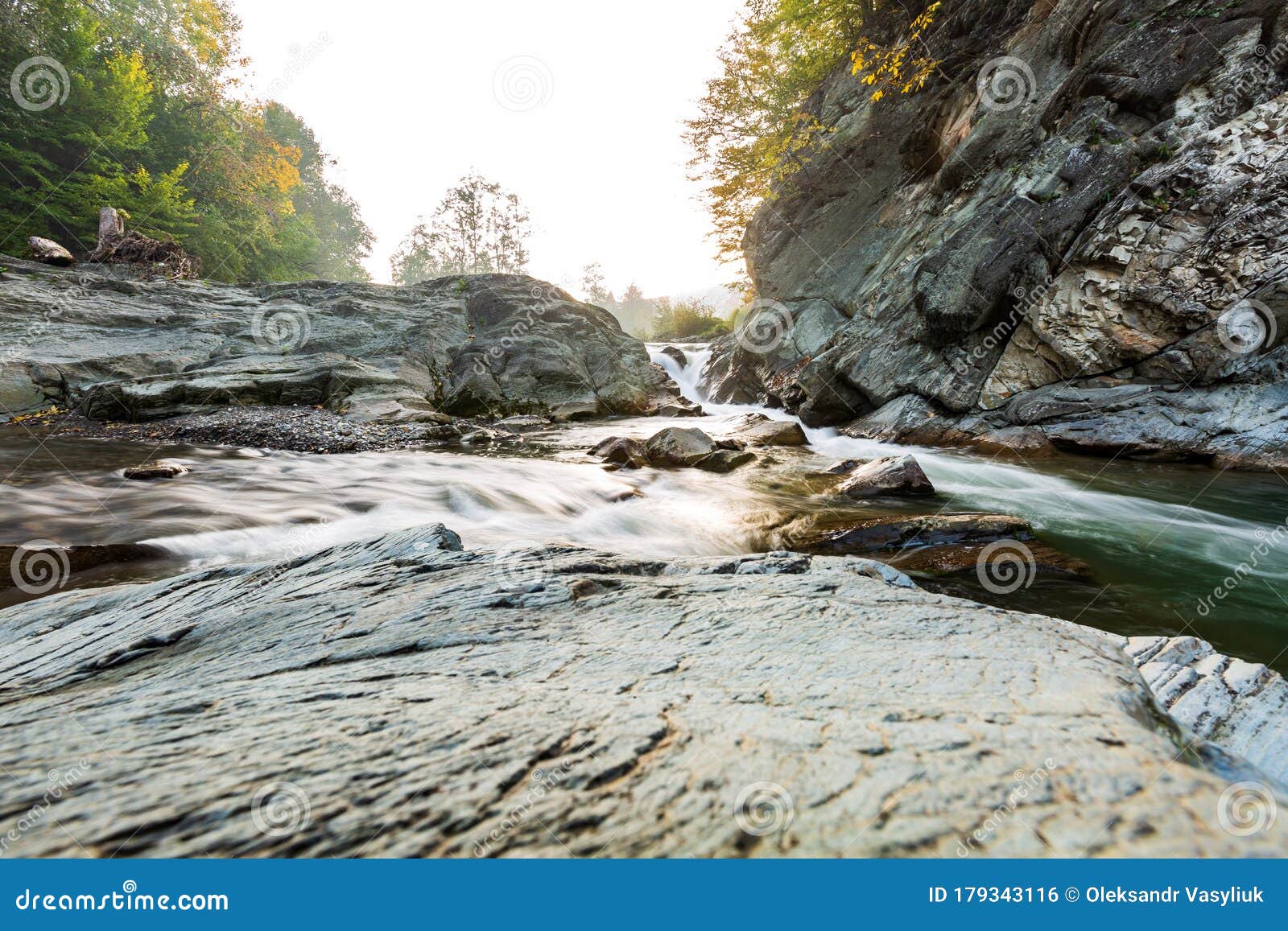 Mountain River Small Waterfall among Rocks Stones in the Rays of the ...