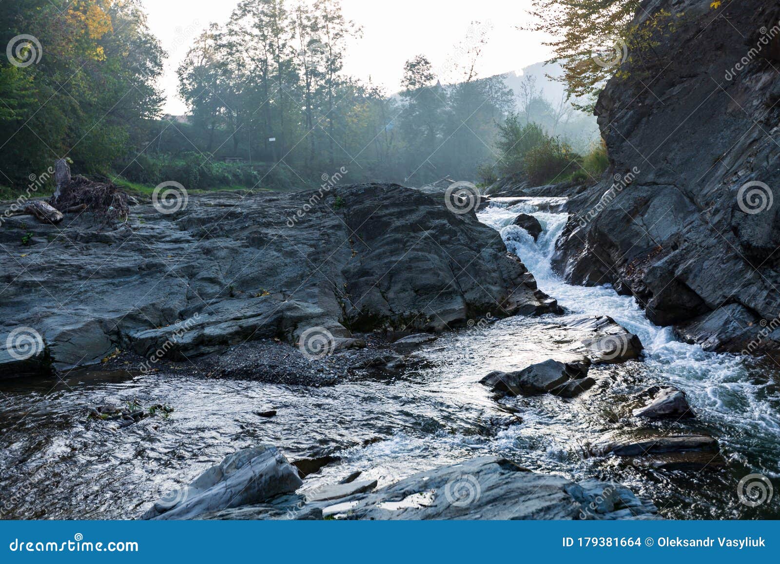 Mountain River Small Waterfall among Rocks Stones in the Rays of the ...