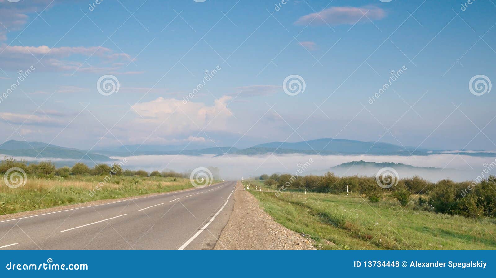 Mountain Road in Mist stock photo. Image of roadside - 13734448