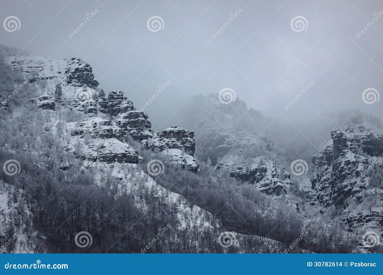 A Mountain Rock Covered with Snow Stock Photo - Image of explore ...