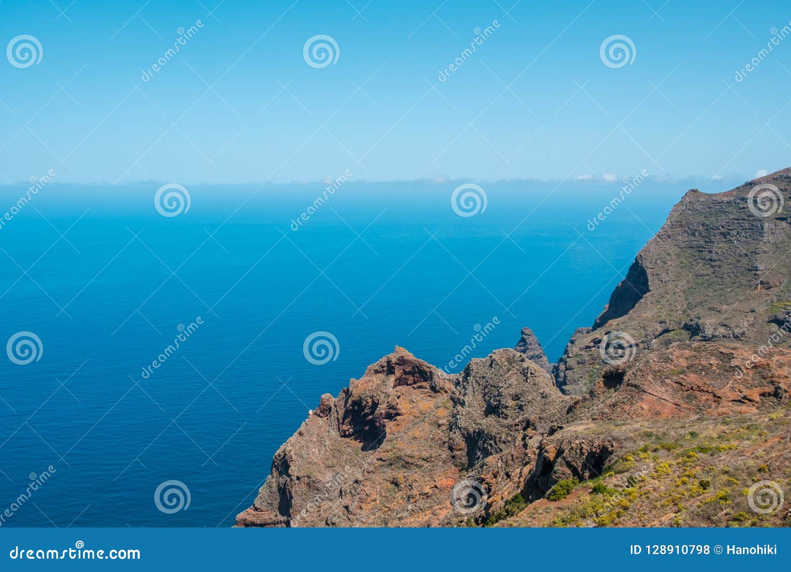Mountain Rocks, Ocean and Blue Sky Background - Coast Landscape Stock ...