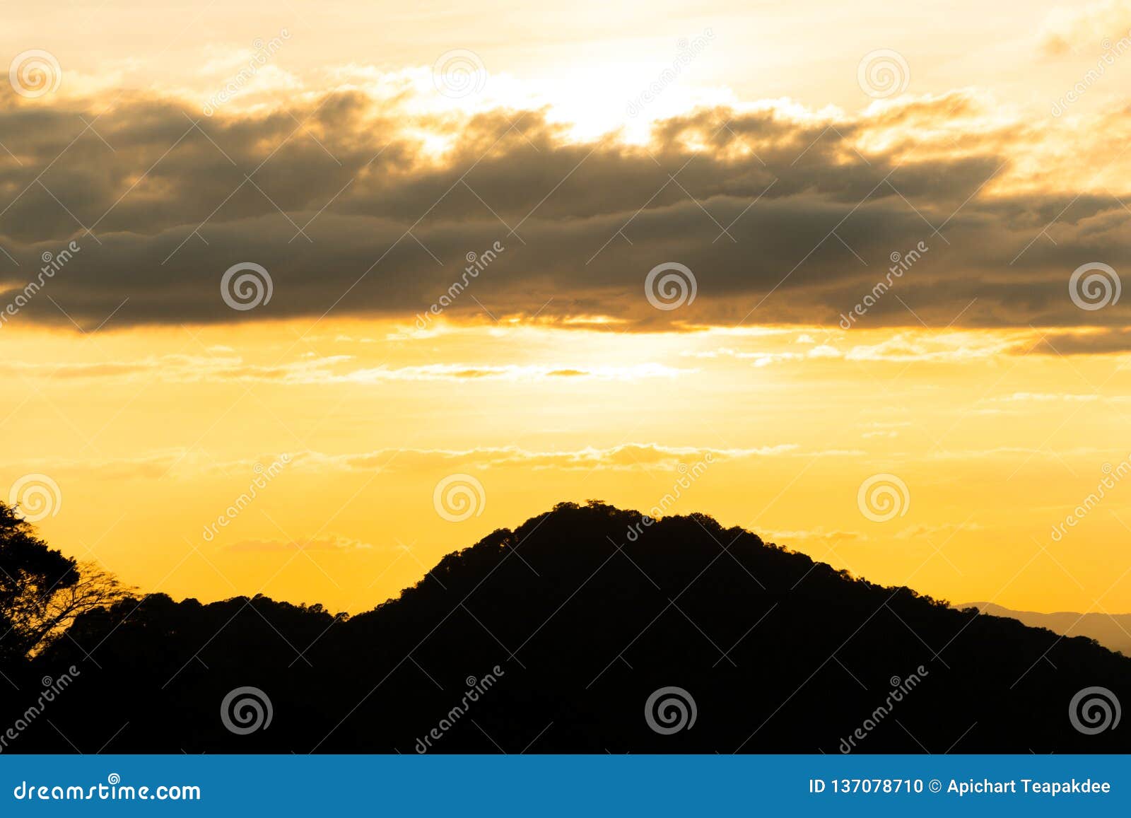 Mountain and sky at sunset stock photo. Image of season - 137078710