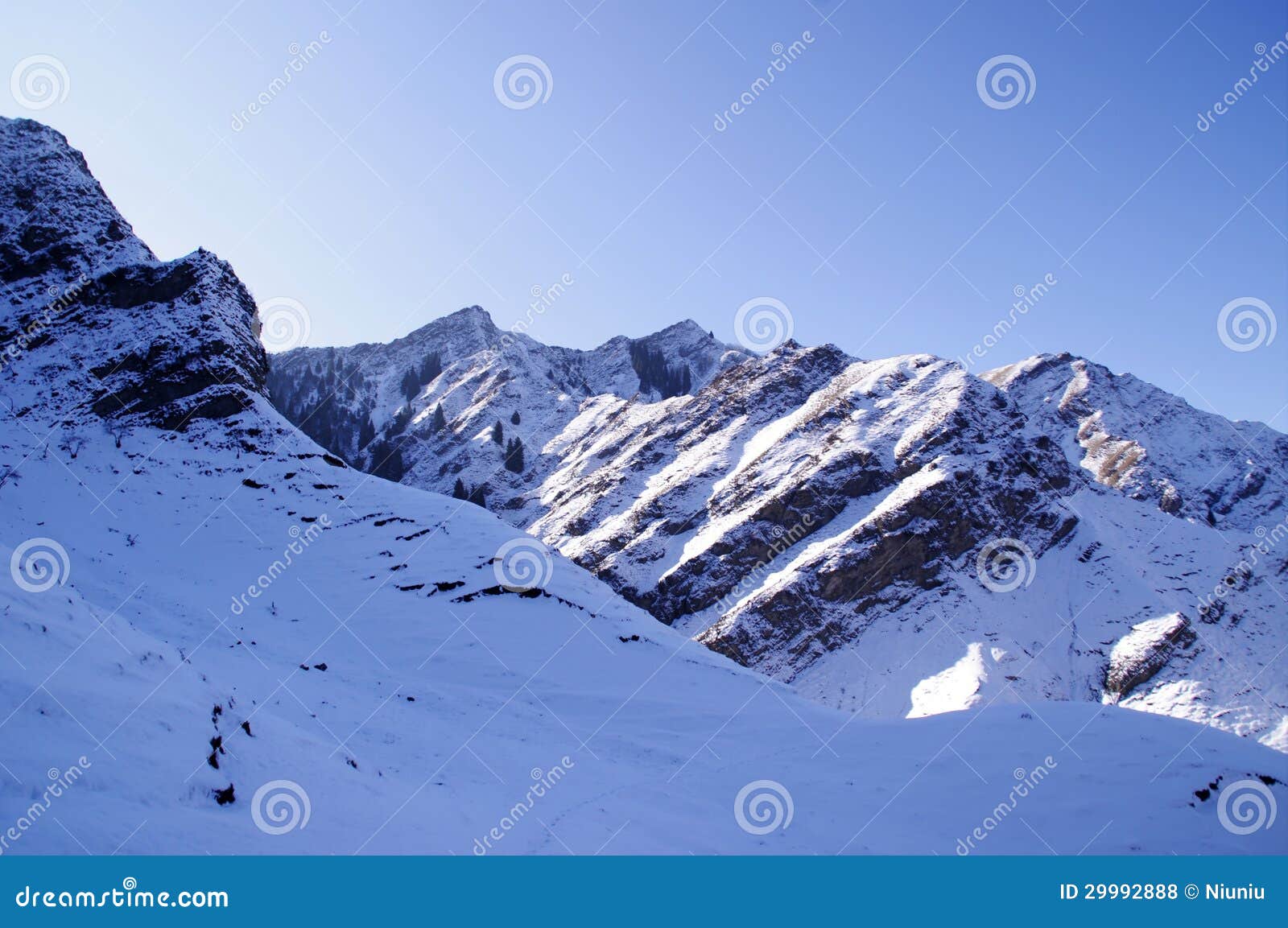 Tianshan Mountain snow stock photo. Image of sunlight - 29992888