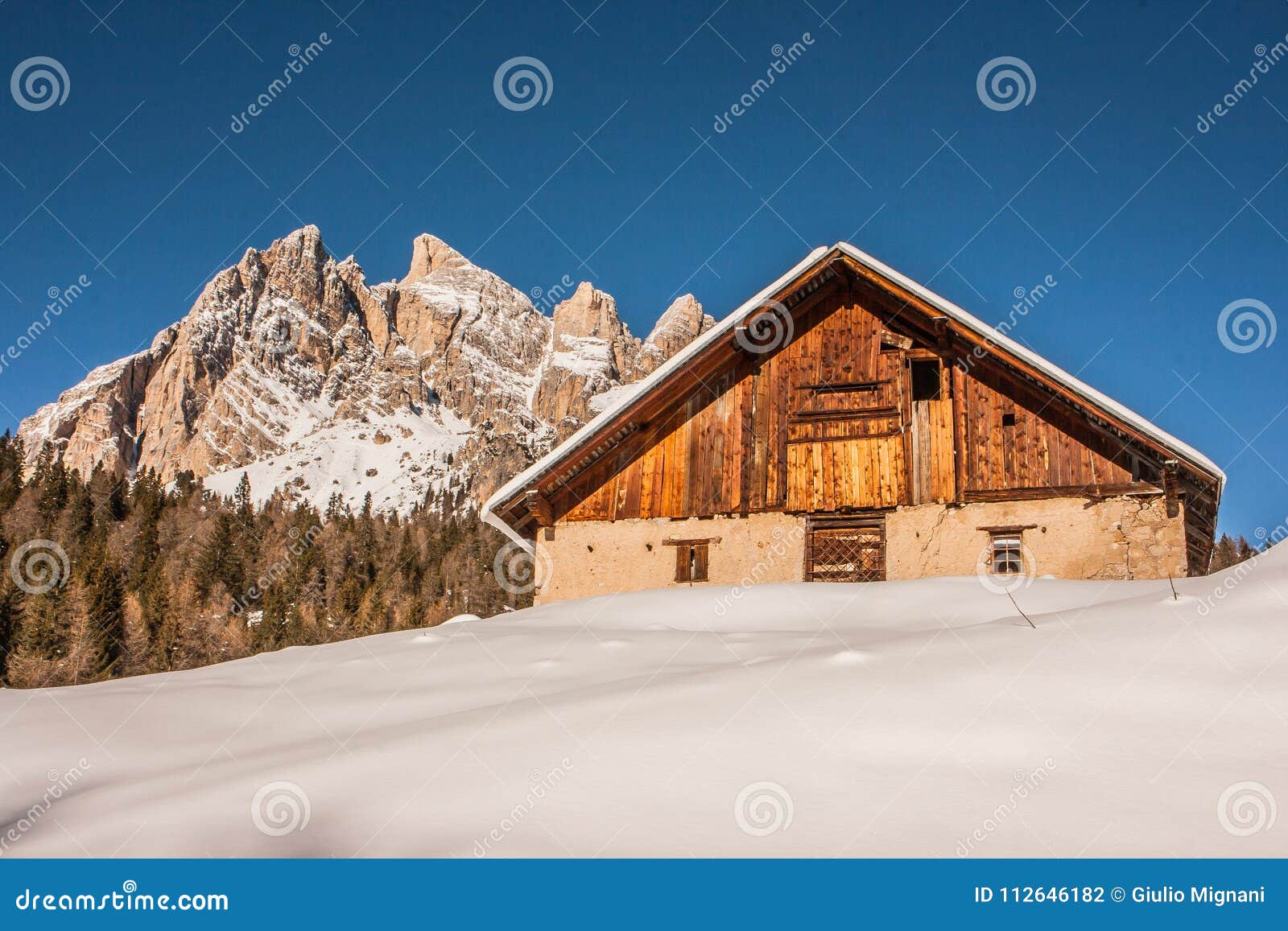Mountain Stable in the Tofane Range Over a Blue Sky after a Snow Stock ...