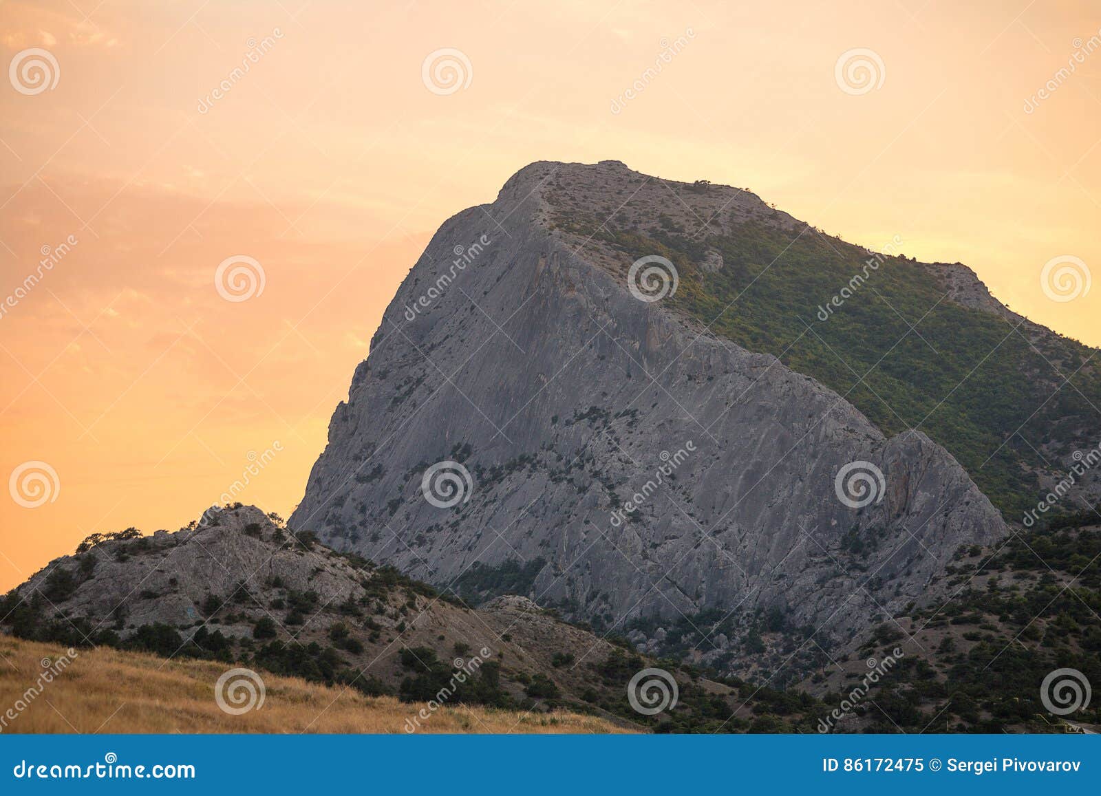 Mountain with Steep Slope at Dawn or Sunset Light Pale Pink Sky Stock ...
