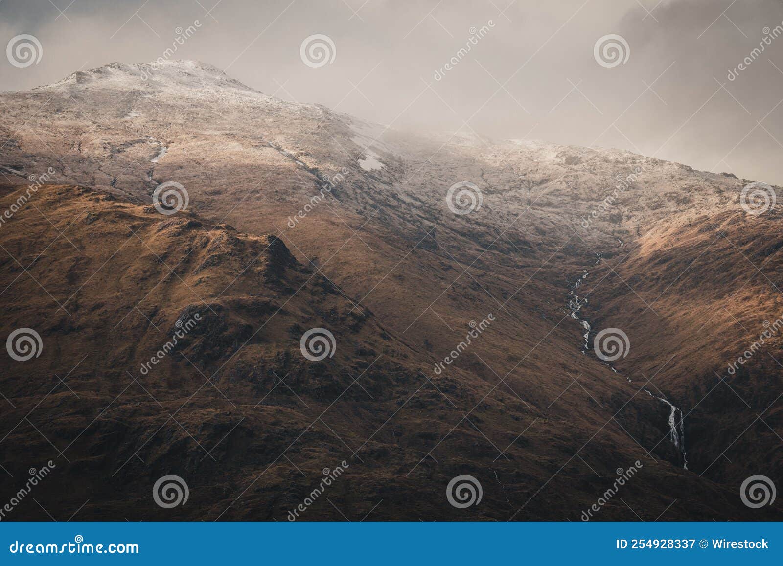 Mountain Waterfall Seen through the Mist in the Scottish Highlands ...