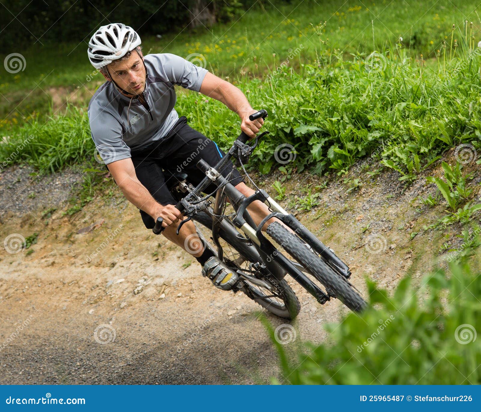 Mountainbiker Driving through a Steep Curve Stock Image - Image of ...