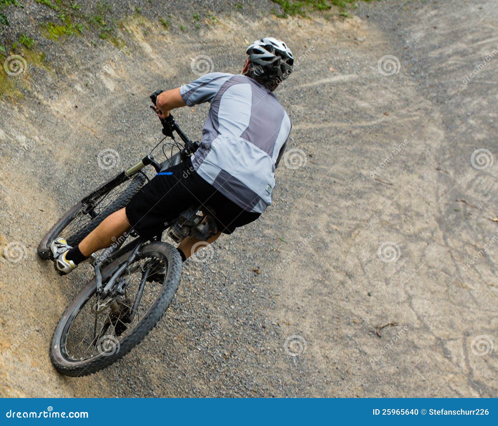 Mountainbiker Driving through a Steep Curve Stock Photo - Image of ...