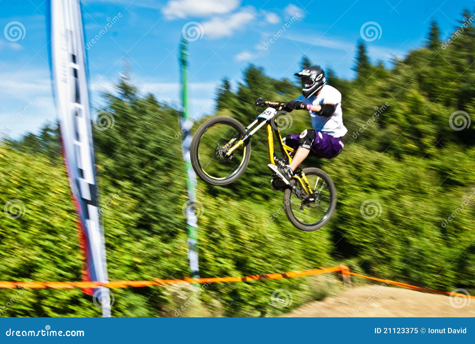 Mountainbiker Jumping - in Motion Blurr Editorial Image - Image of fast ...