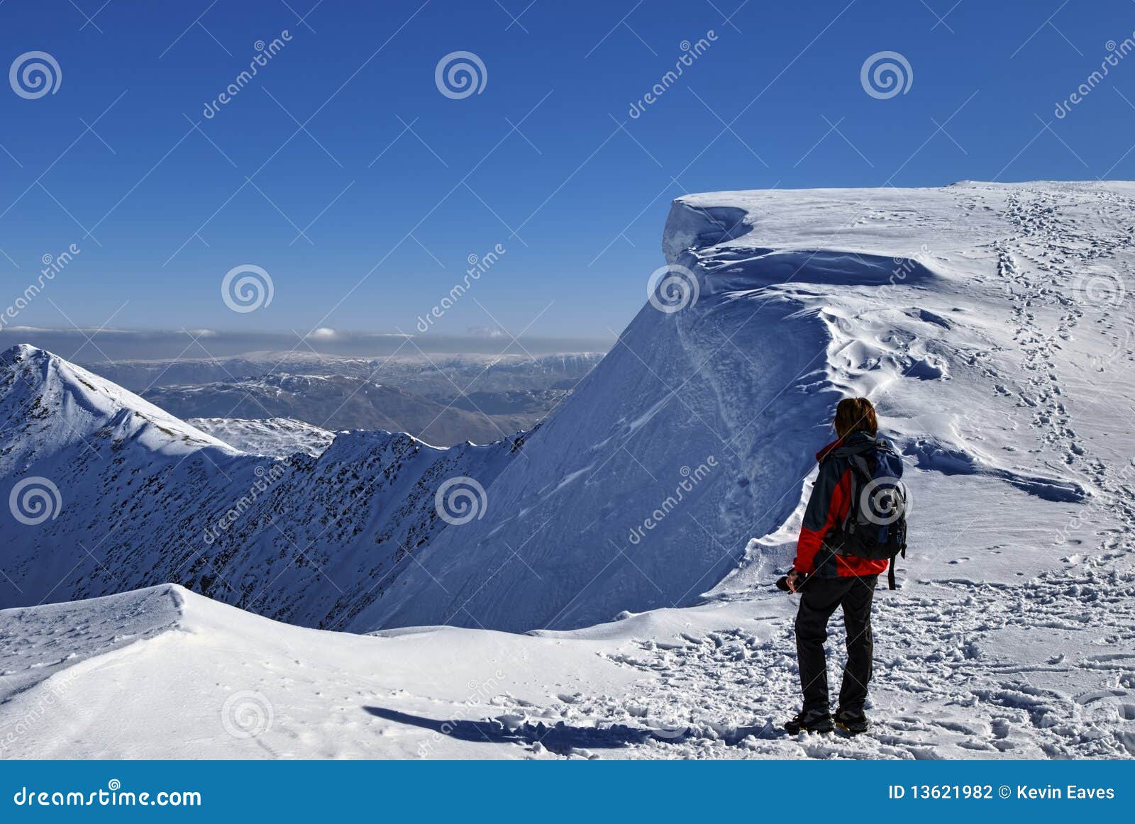 Mountaineer on Snowy Summit Stock Photo - Image of rear, alone: 13621982