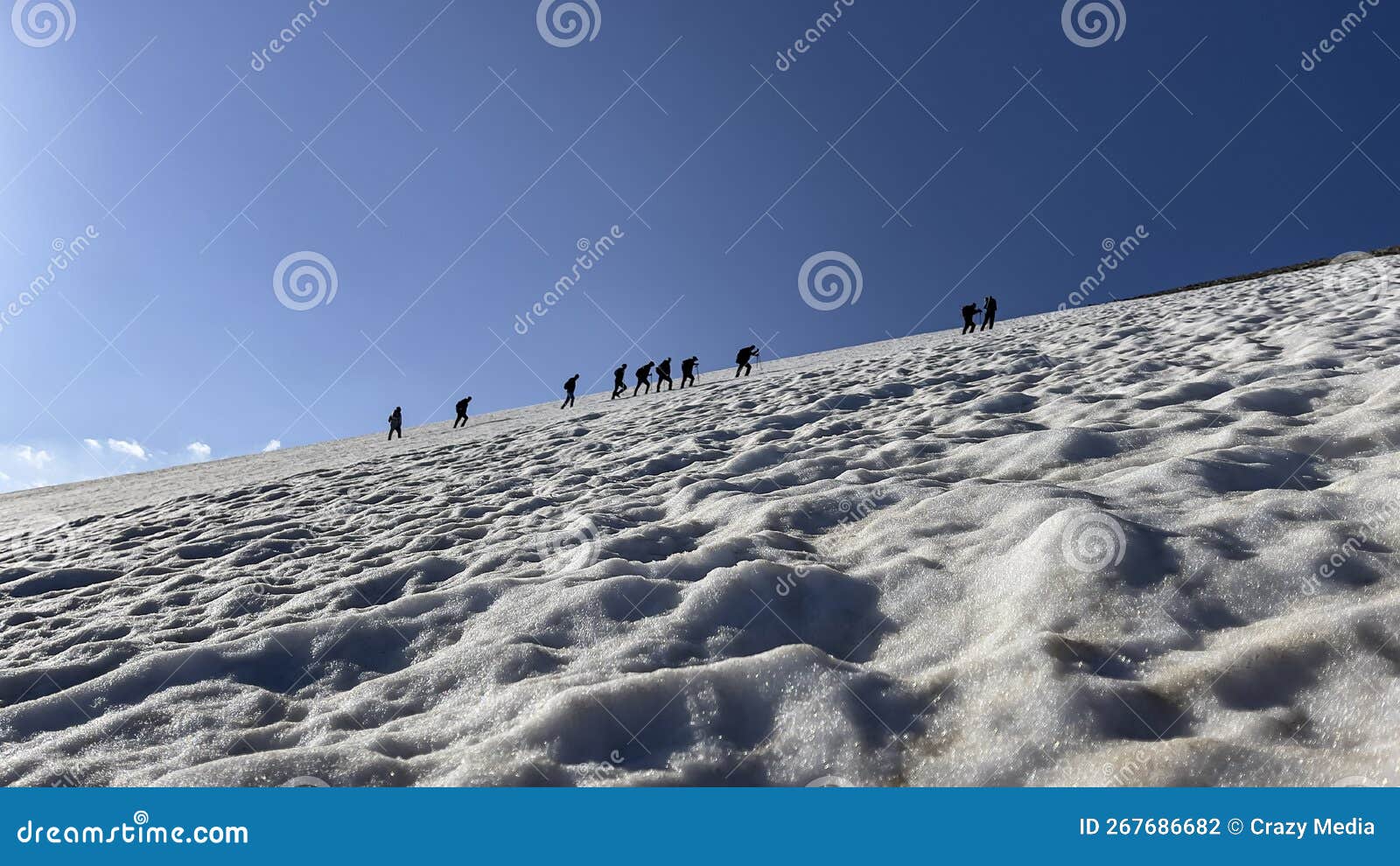 Mountaineers Walking through the Sloping Mountain Range and Snowscapes ...