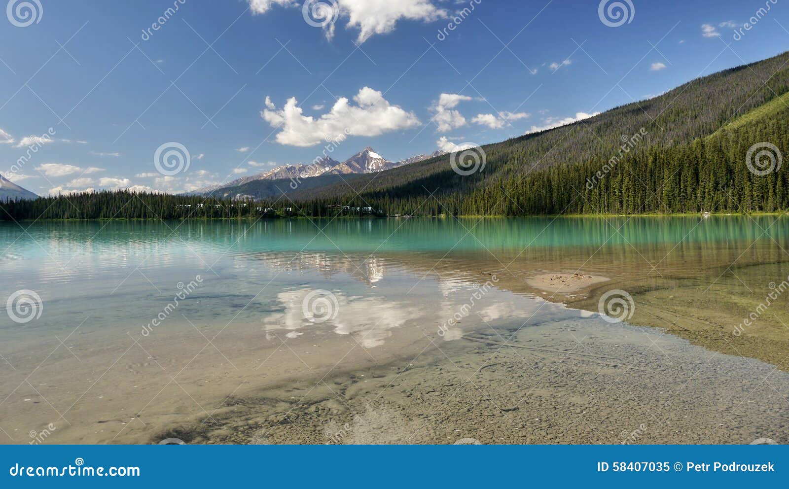 Mountains and Clouds Reflected in a Mountain Colored Lake. Stock Image ...